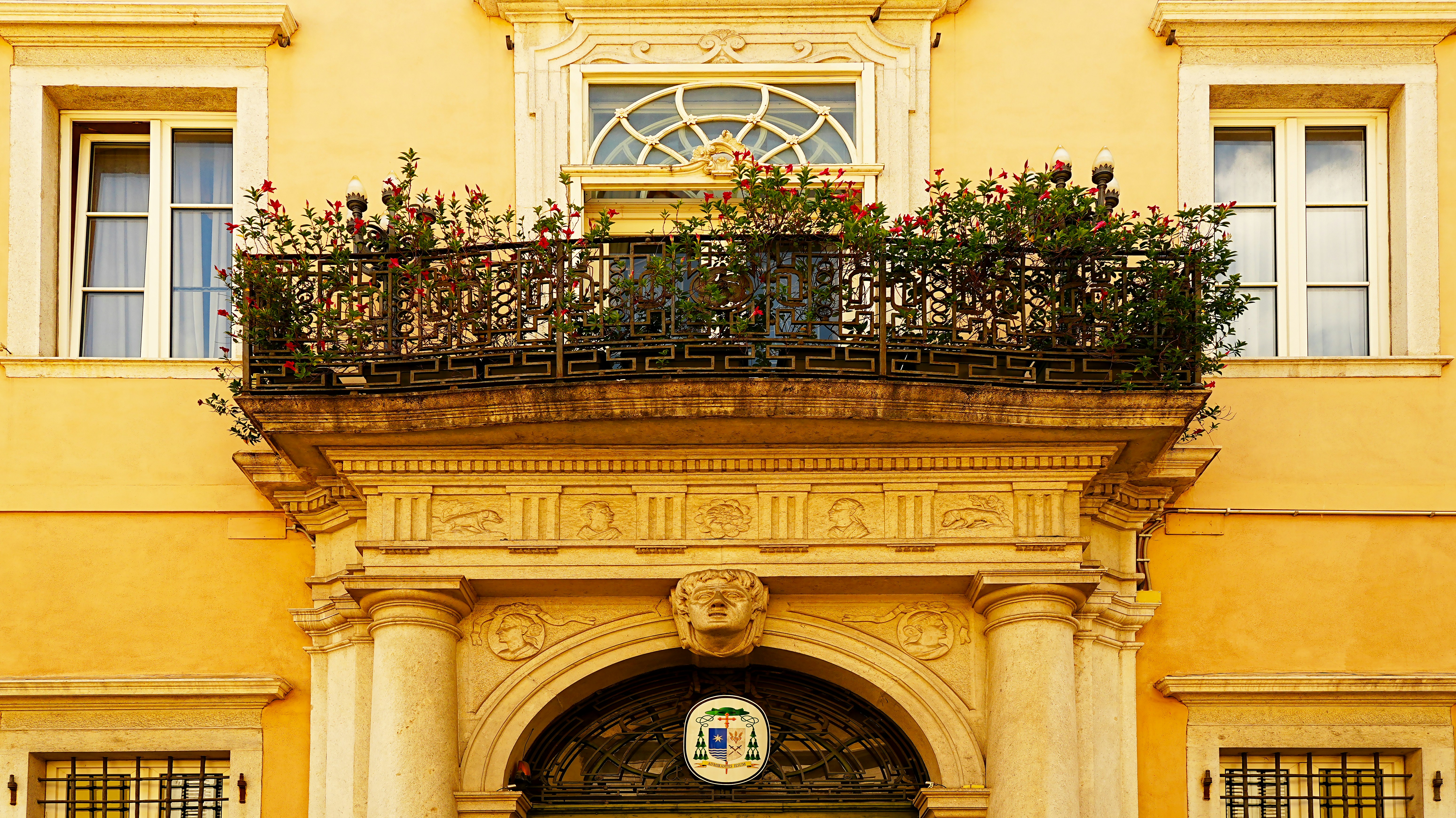 Elegance in Yellow: A Balconied Facade