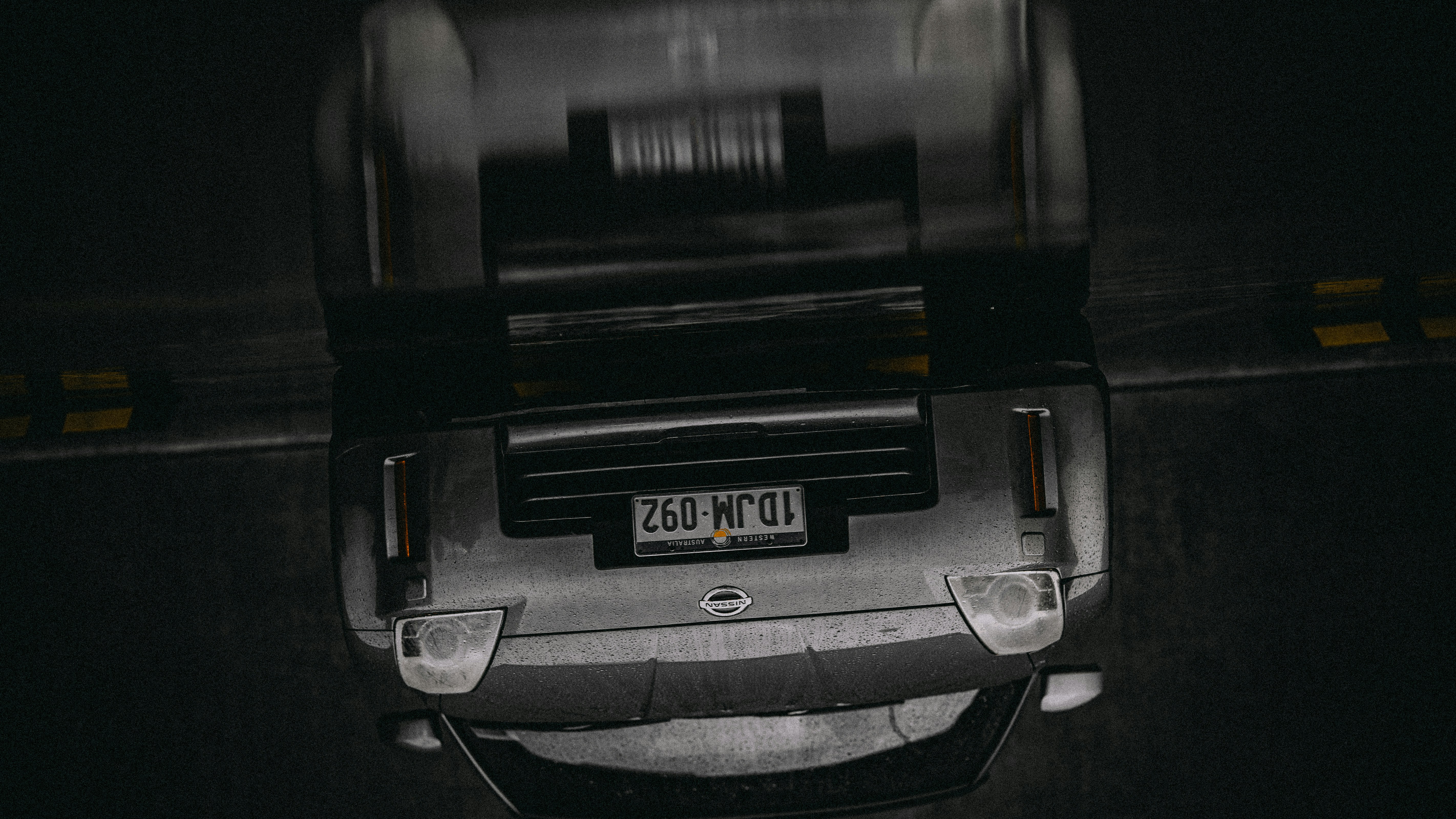 Urban Reflections: A Car's Silent Journey