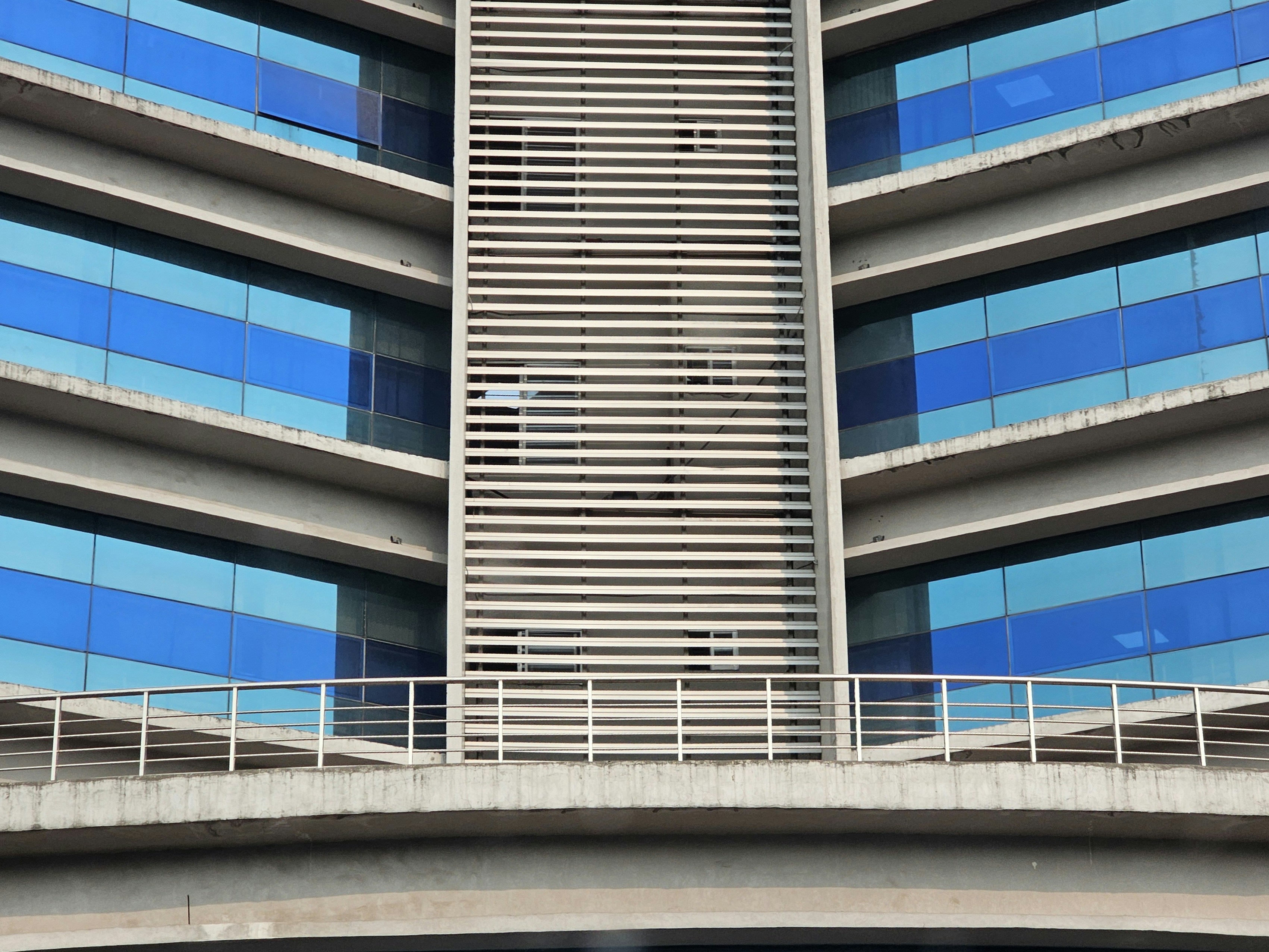 Modern building facade with blue glass windows