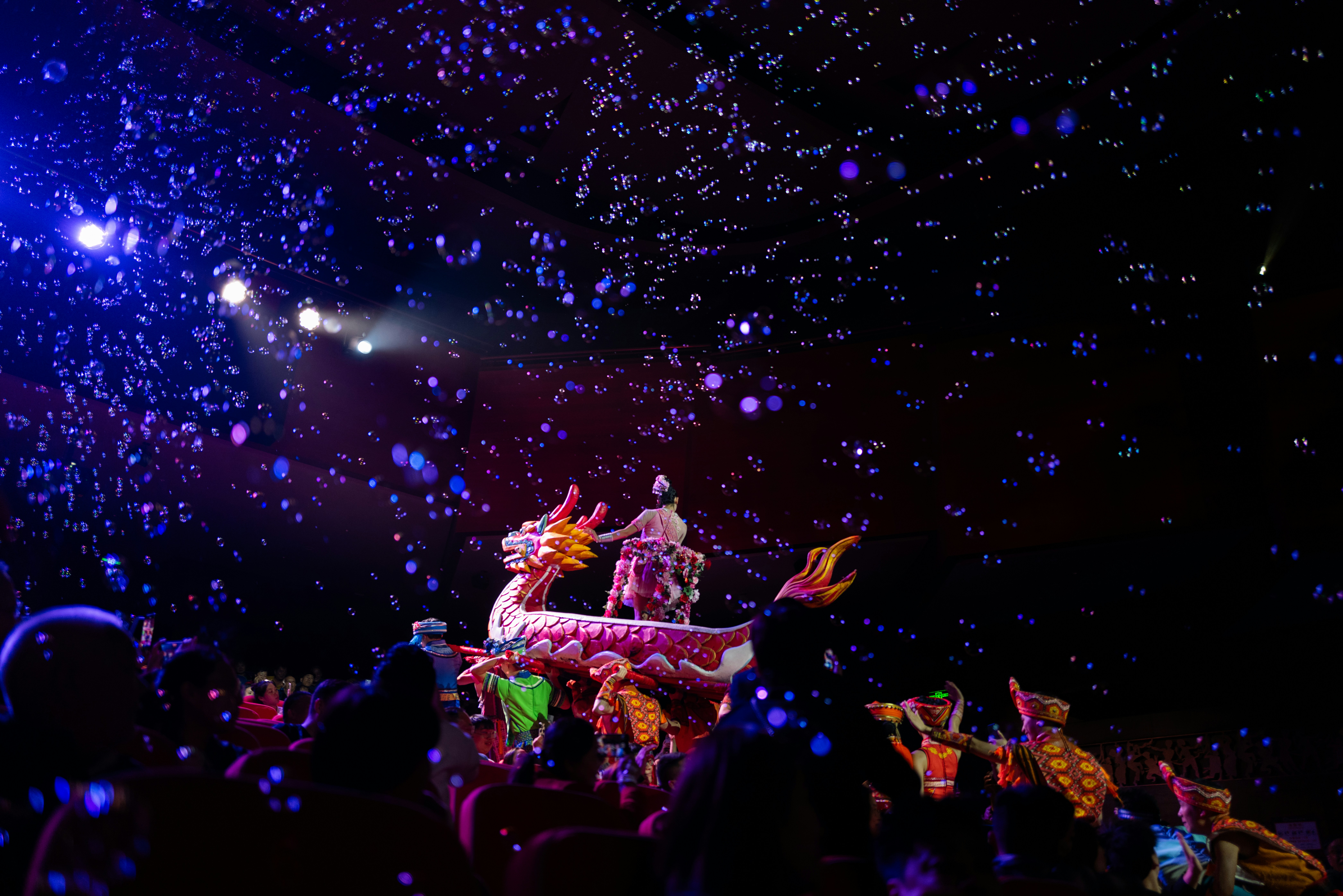 Floating Fire Dragon Parade Under Starry Confetti