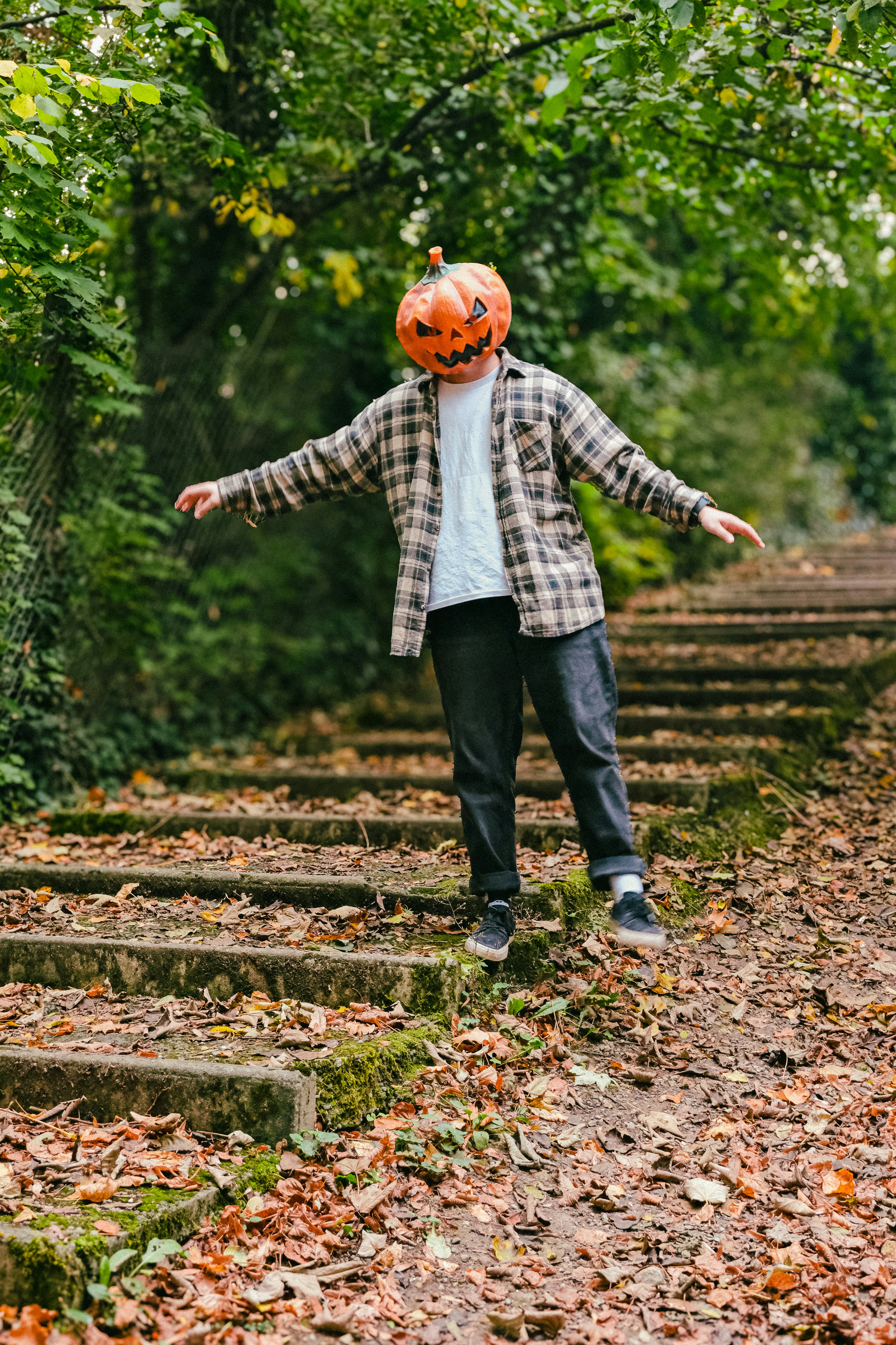 Pumpkin-Headed Leap on Leaf-Strewn Steps