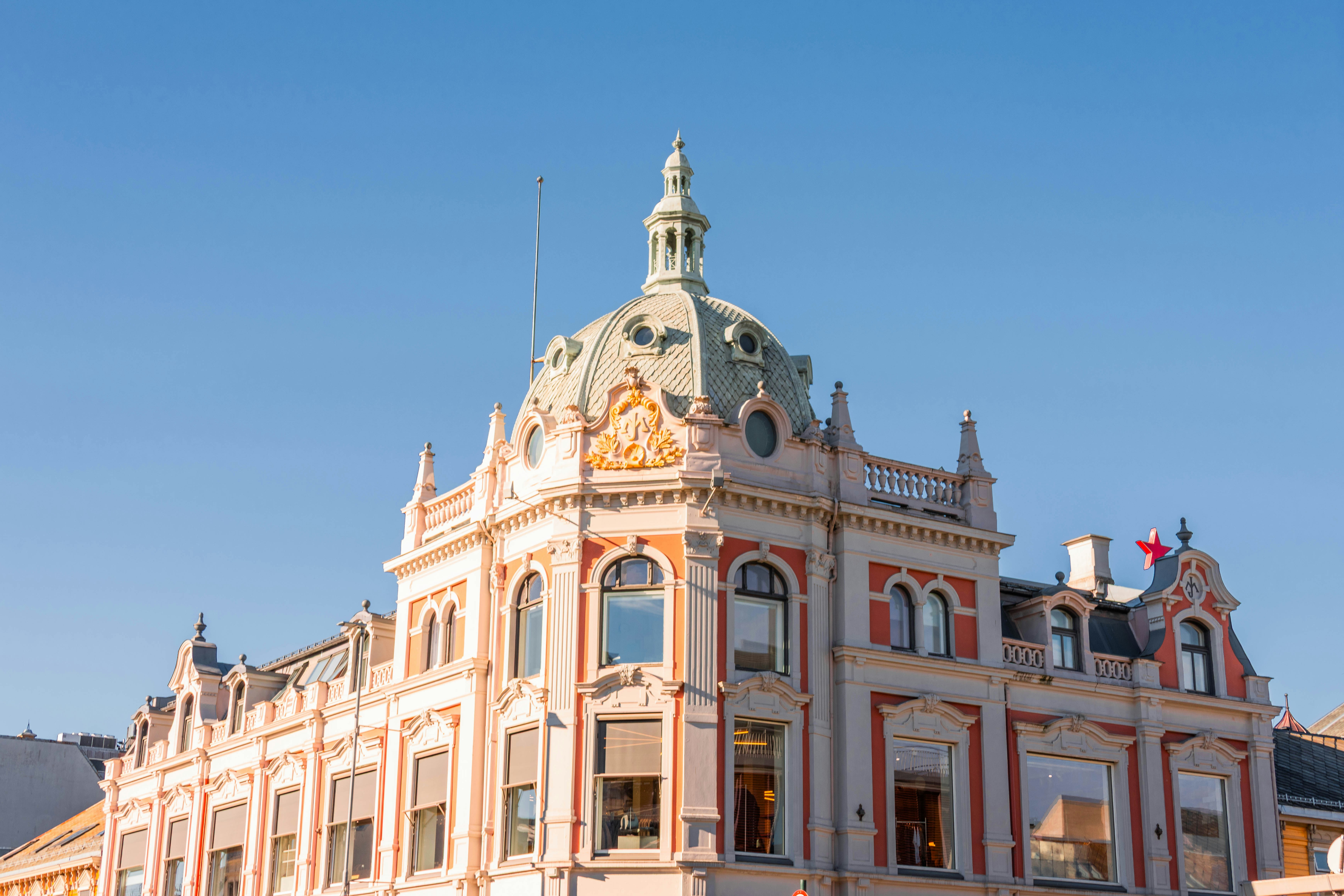 Ornate building with a domed roof against blue sky