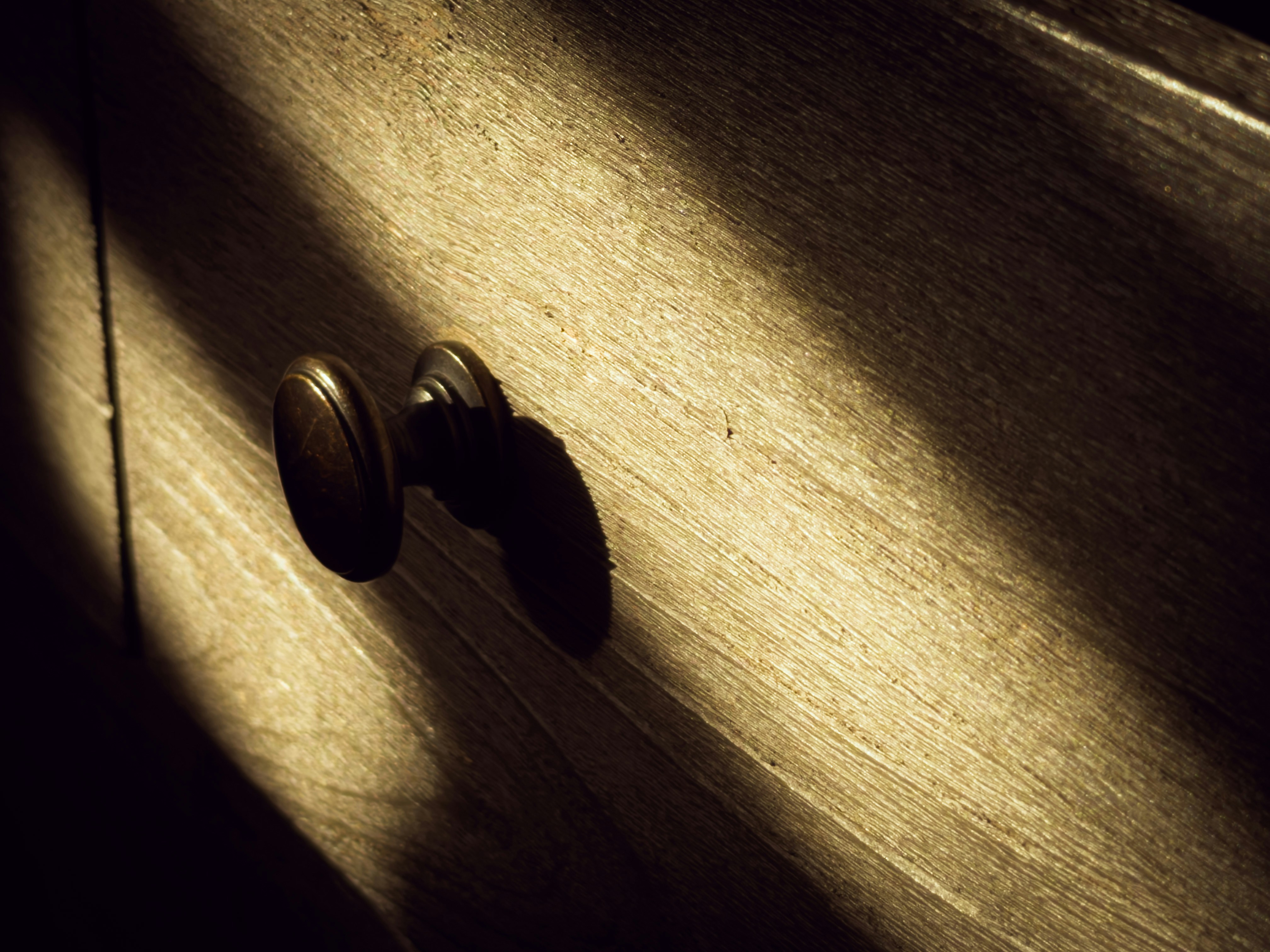 Whispers of Time: The Drawer Handle's Tale