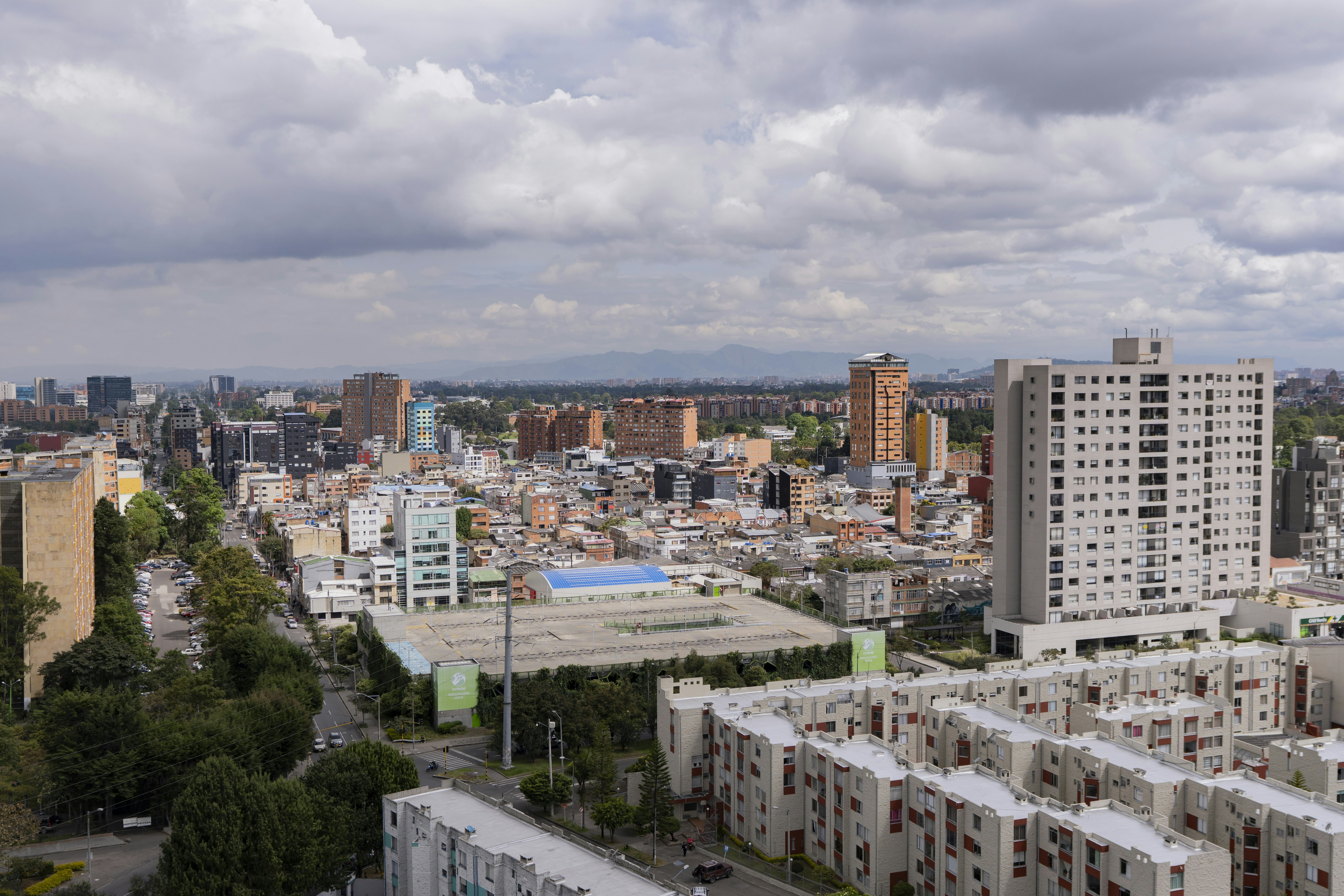 Cityscape with buildings under a cloudy sky