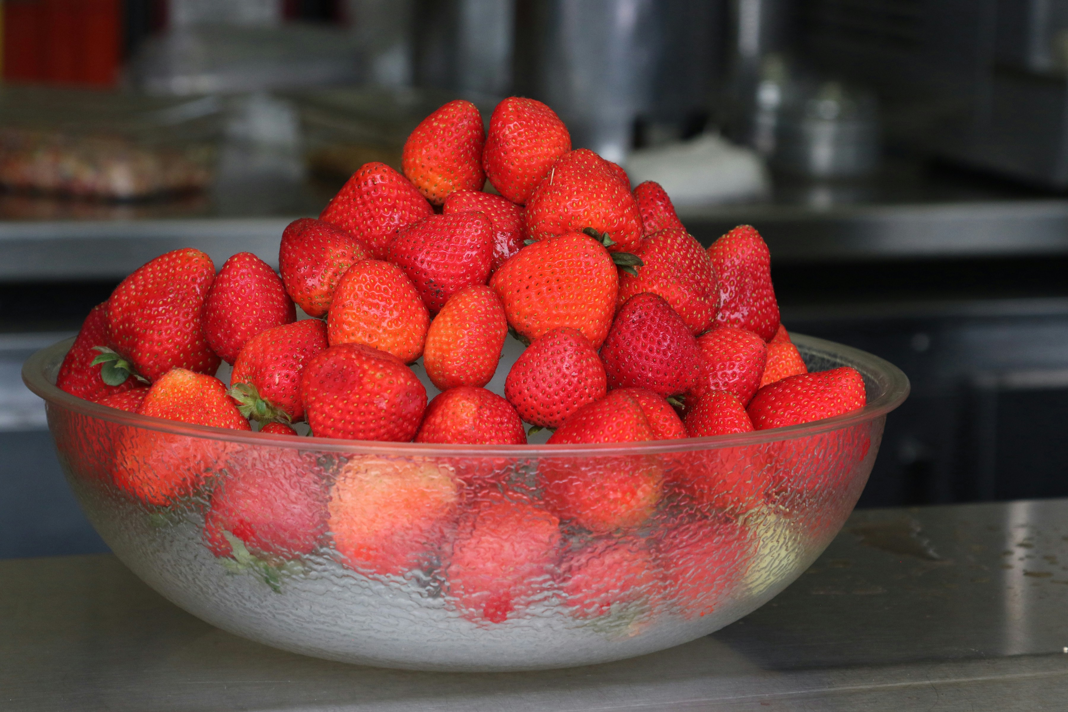 Harvest of Sweetness: A Bowl of Juicy Strawberries
