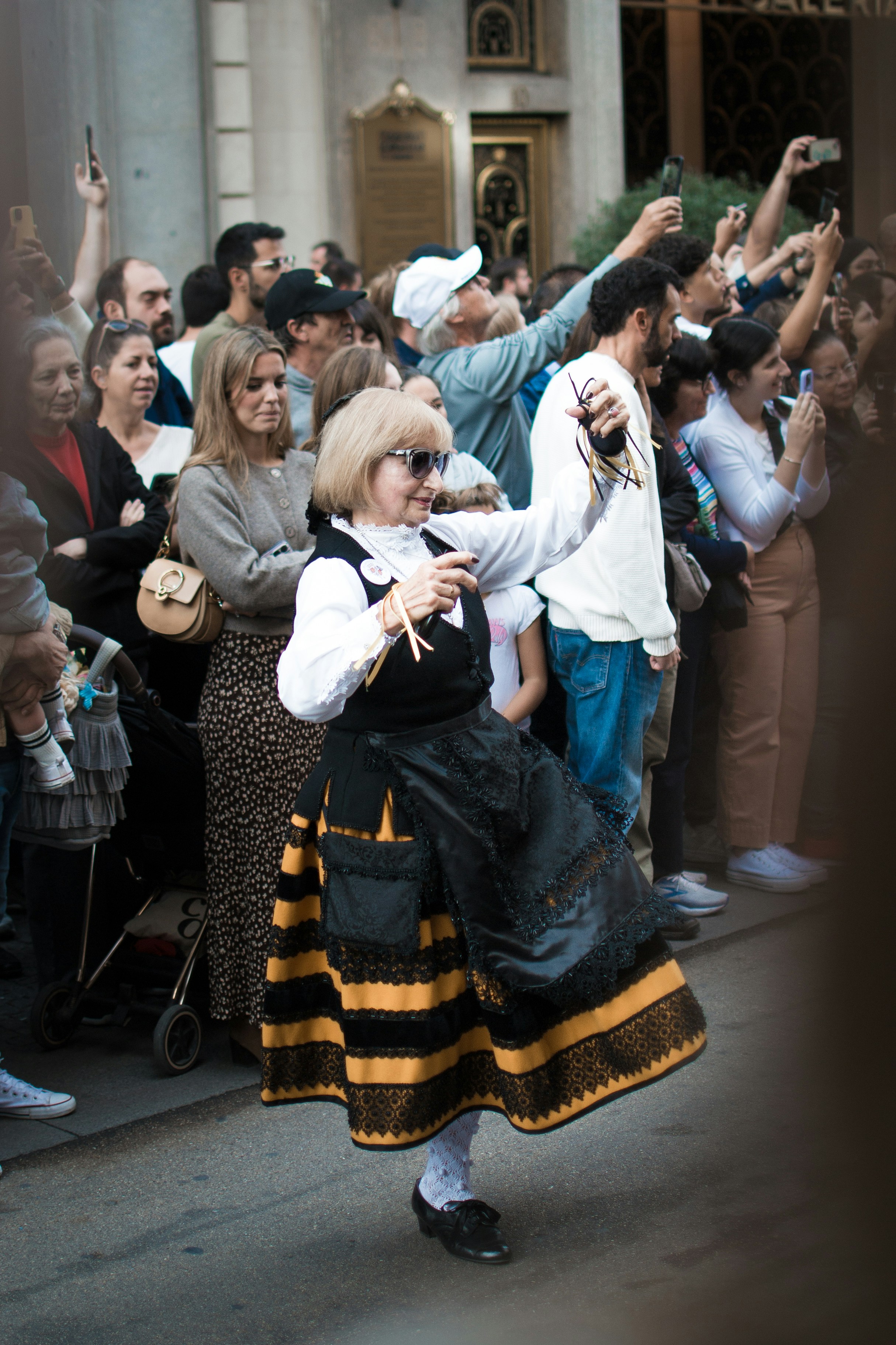 Flamenco Flourish: A Central Figure Dances Through the City Crowd