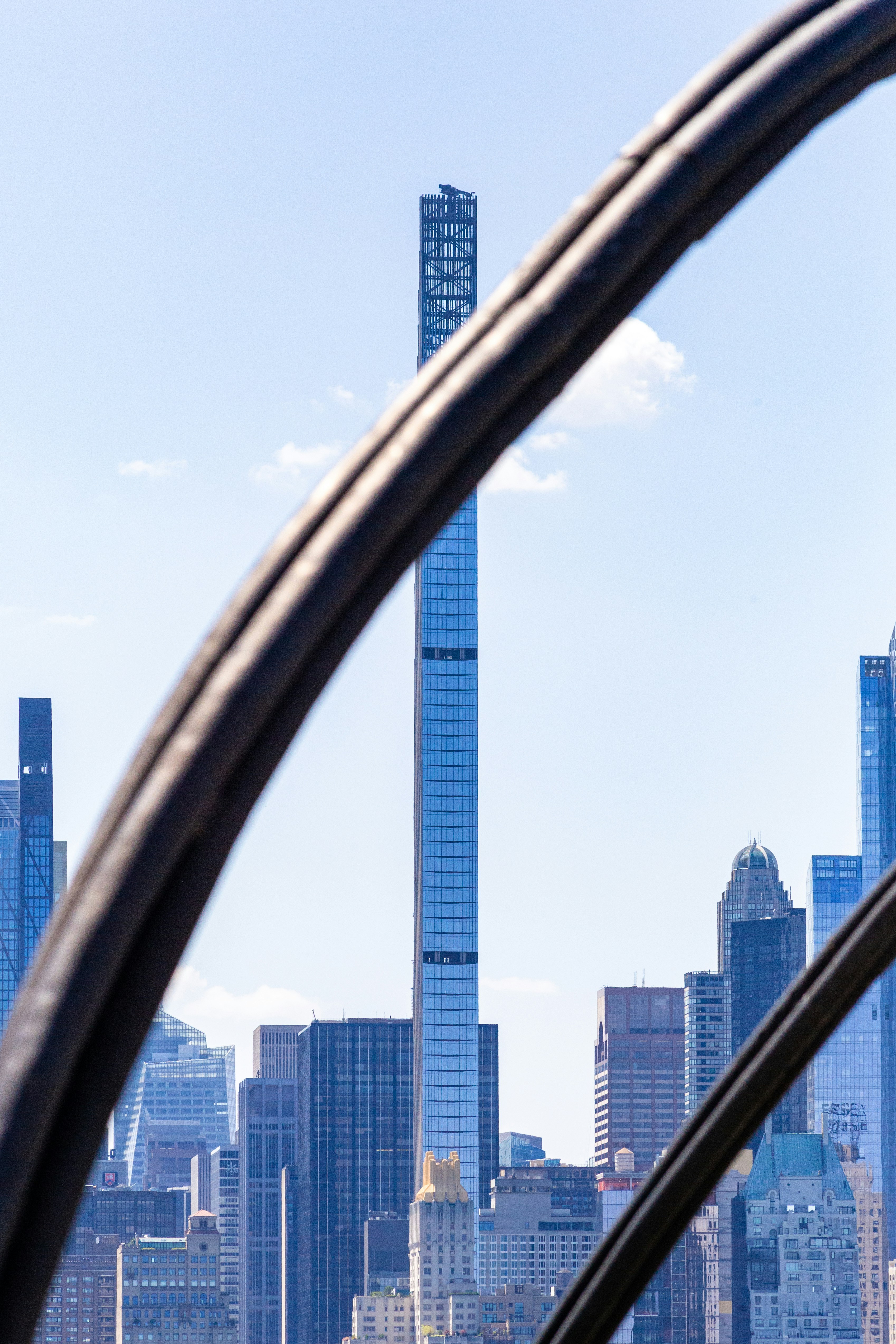 Tall skyscraper among new york city buildings