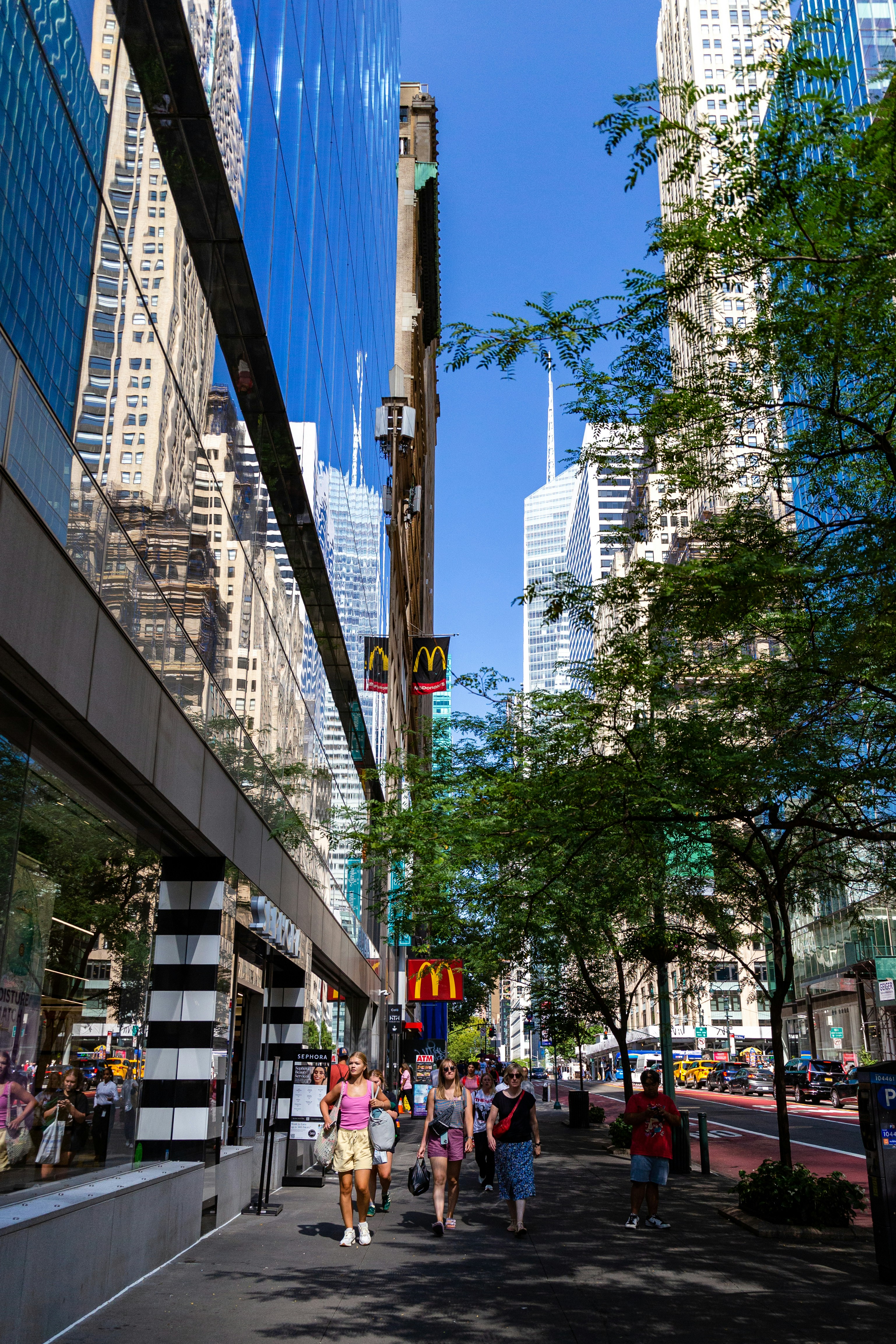 Glass Canopies and Pedestrian Pulse: A City Street Portrait