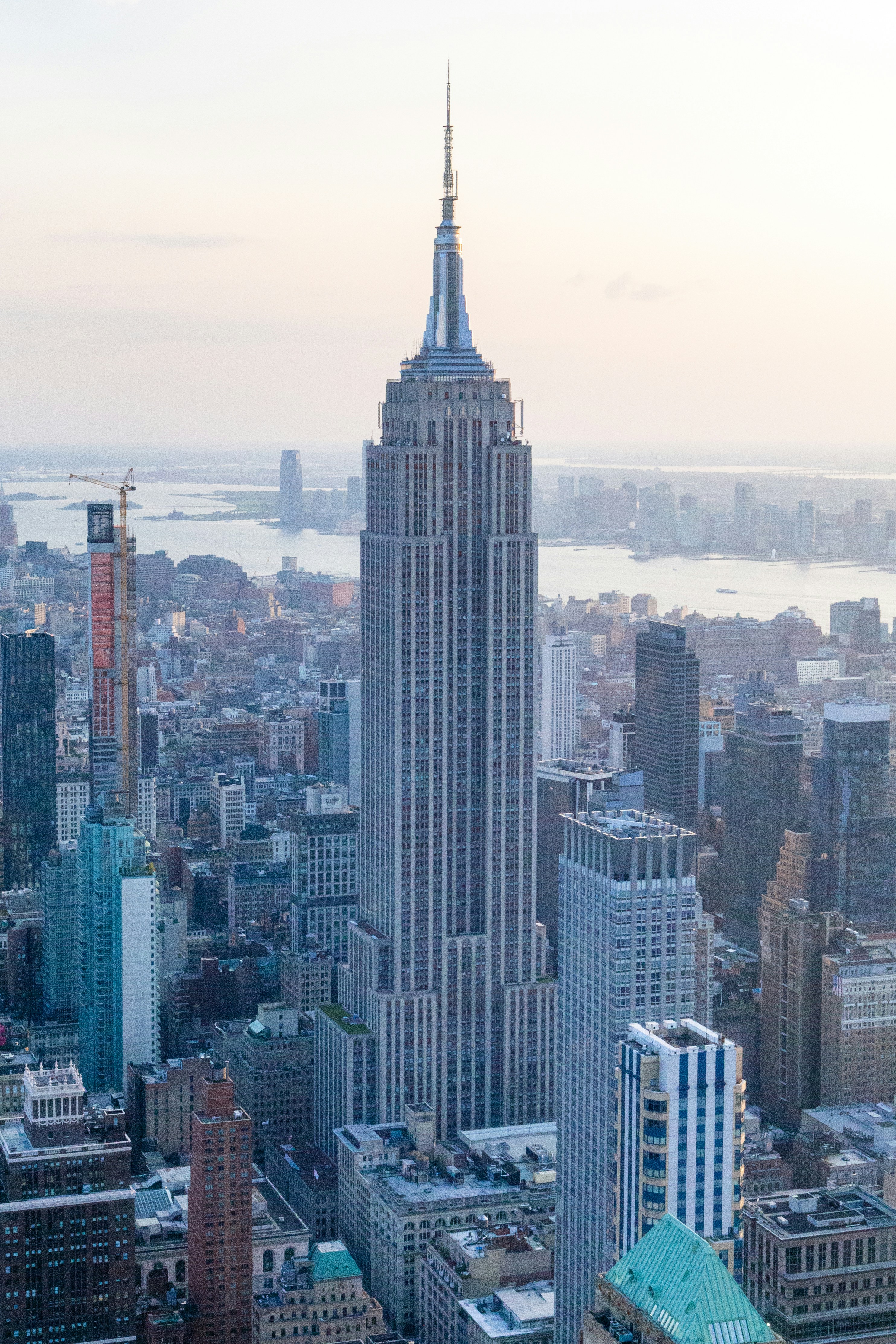 Empire state building towering over new york city skyline