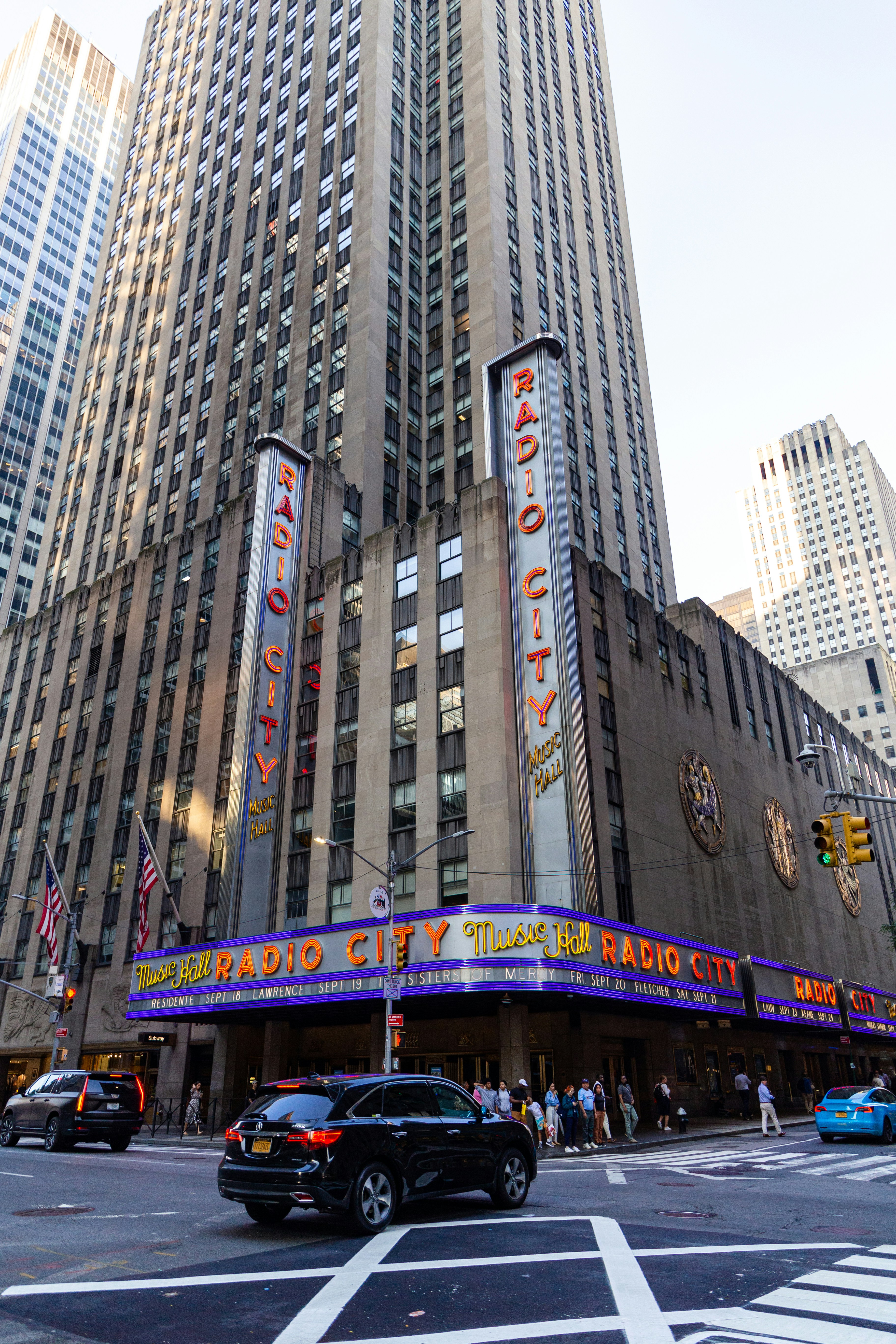Neon marquee and towering theater facade on Broadway