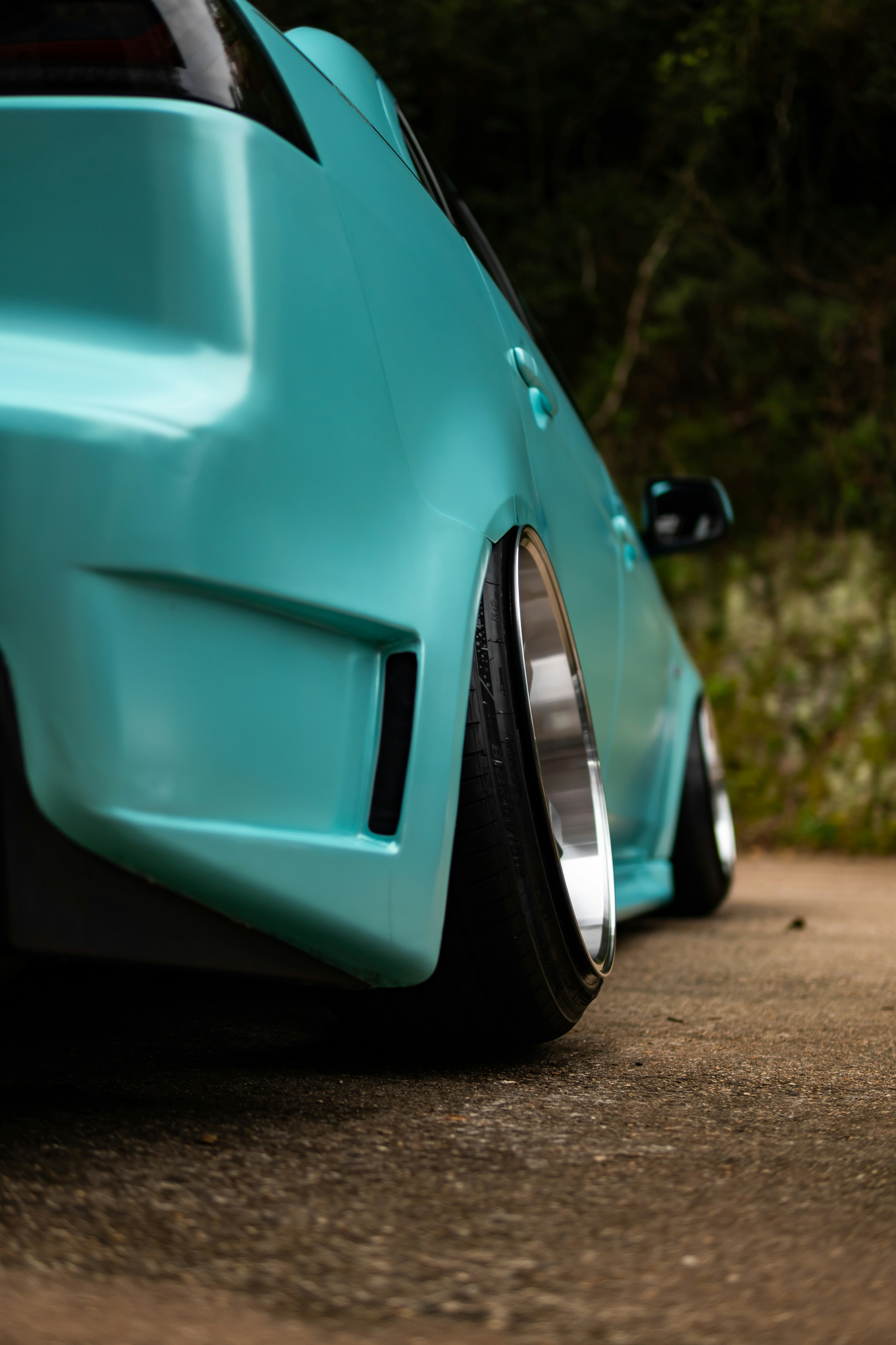 Close-up of a teal car with chrome rims. photo – Free Vehicle Image on ...