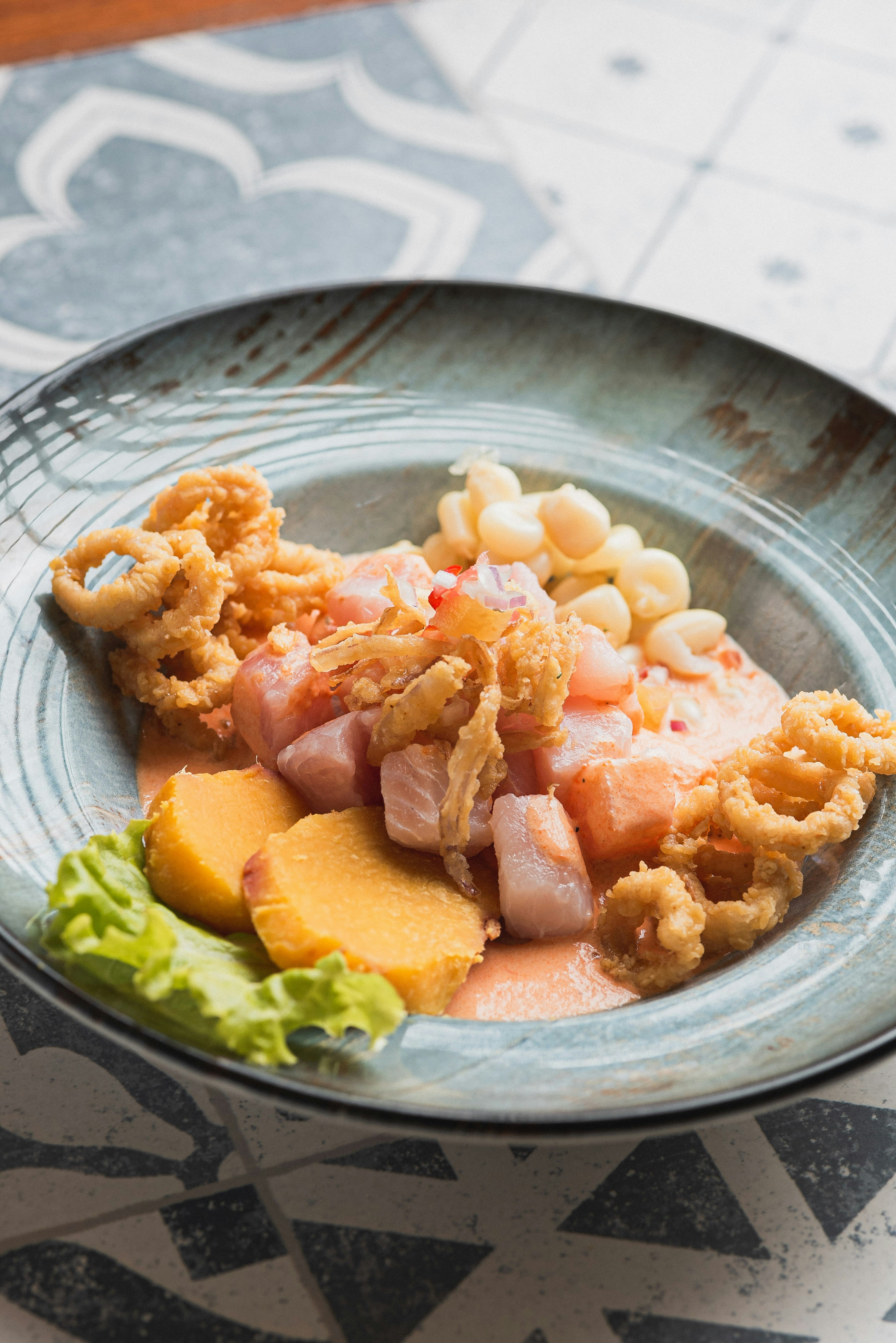 Azure Plate, Crunchy Rings, and Rosy Cubes: A Creamy, Textured Plate