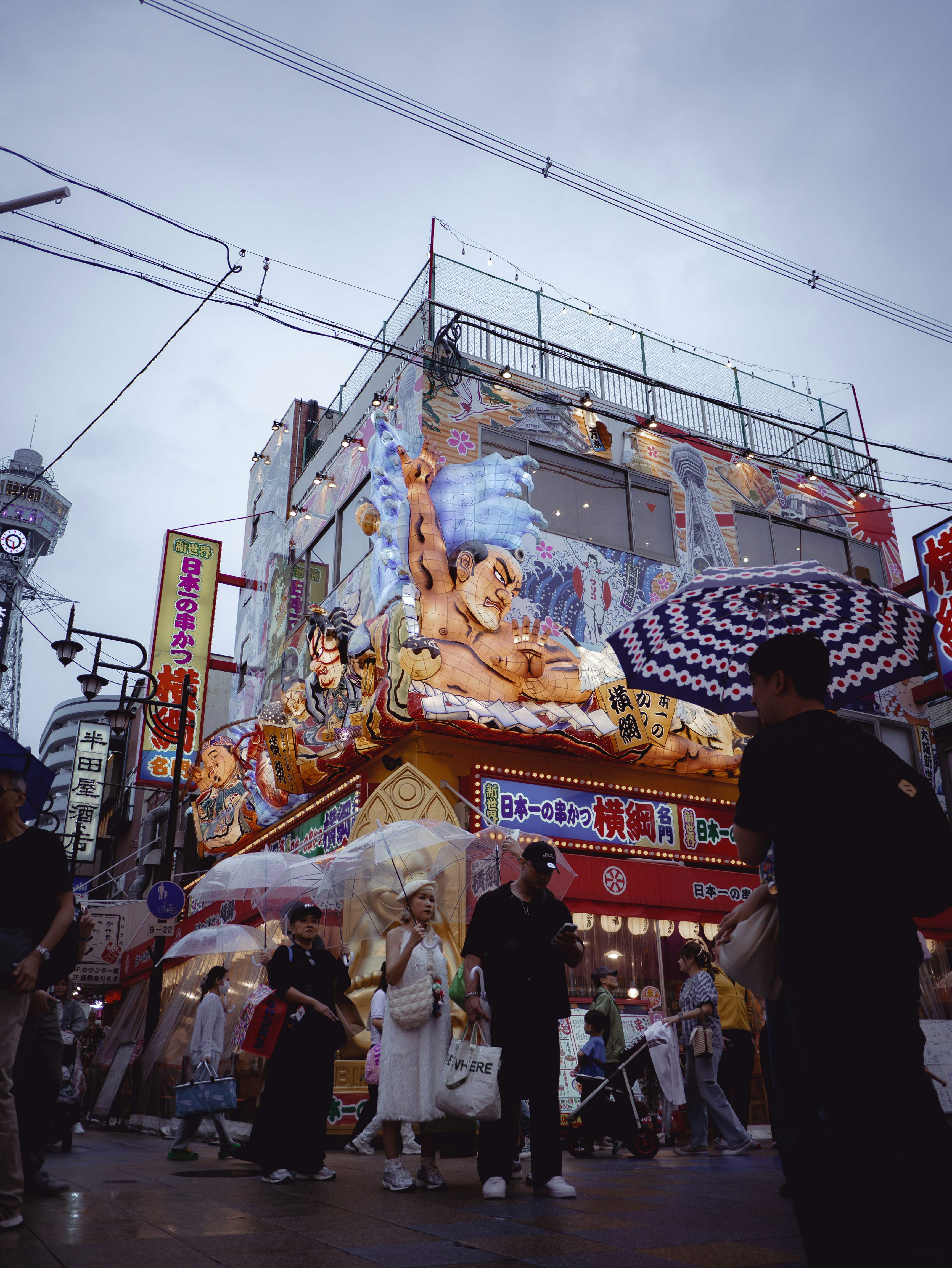 Gigantic Festival Float Dominates a Bustling Japanese Street at Night