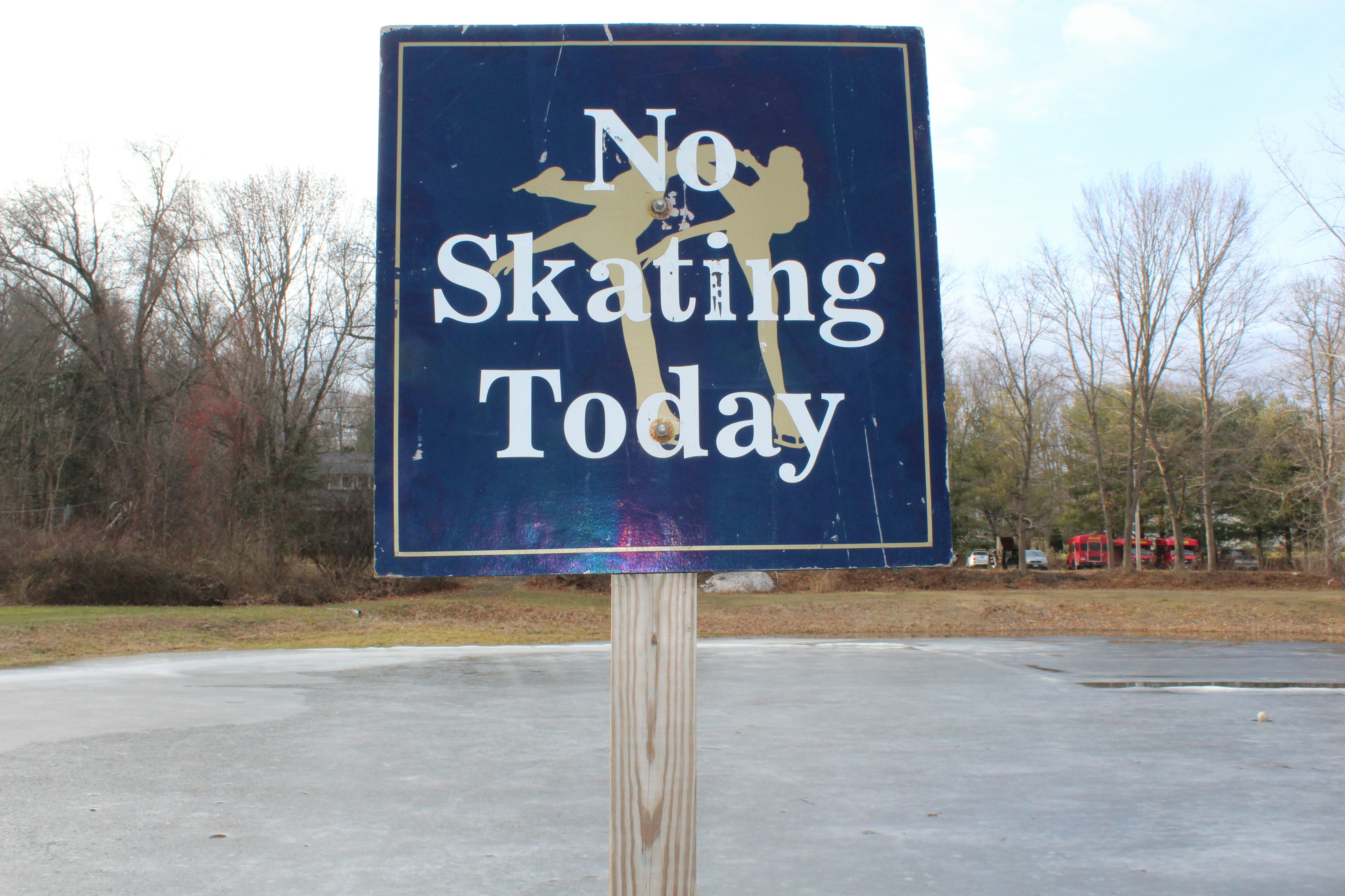 No Skating Today | No skating today sign on the ice.