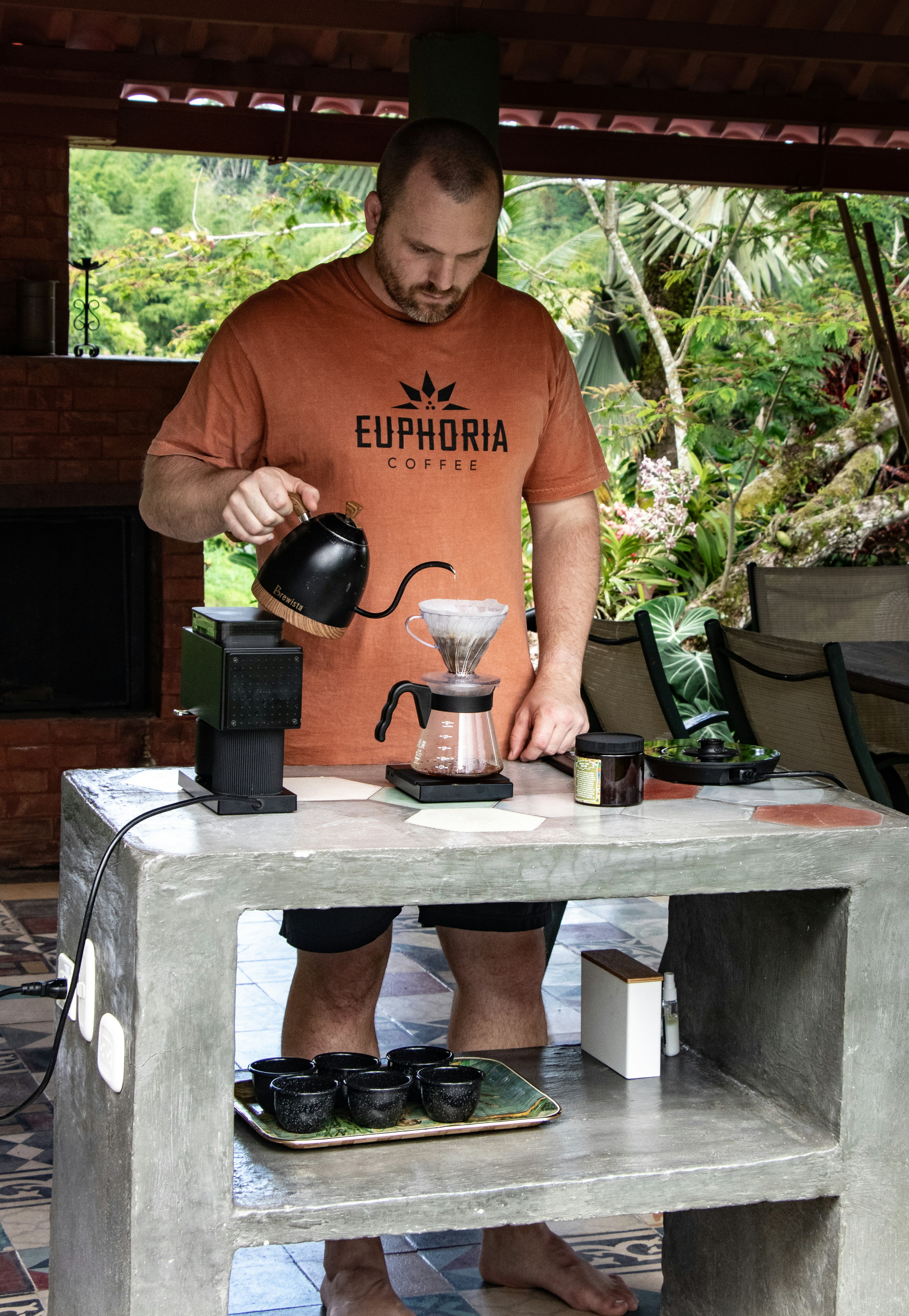 Man pouring hot water into a coffee filter
