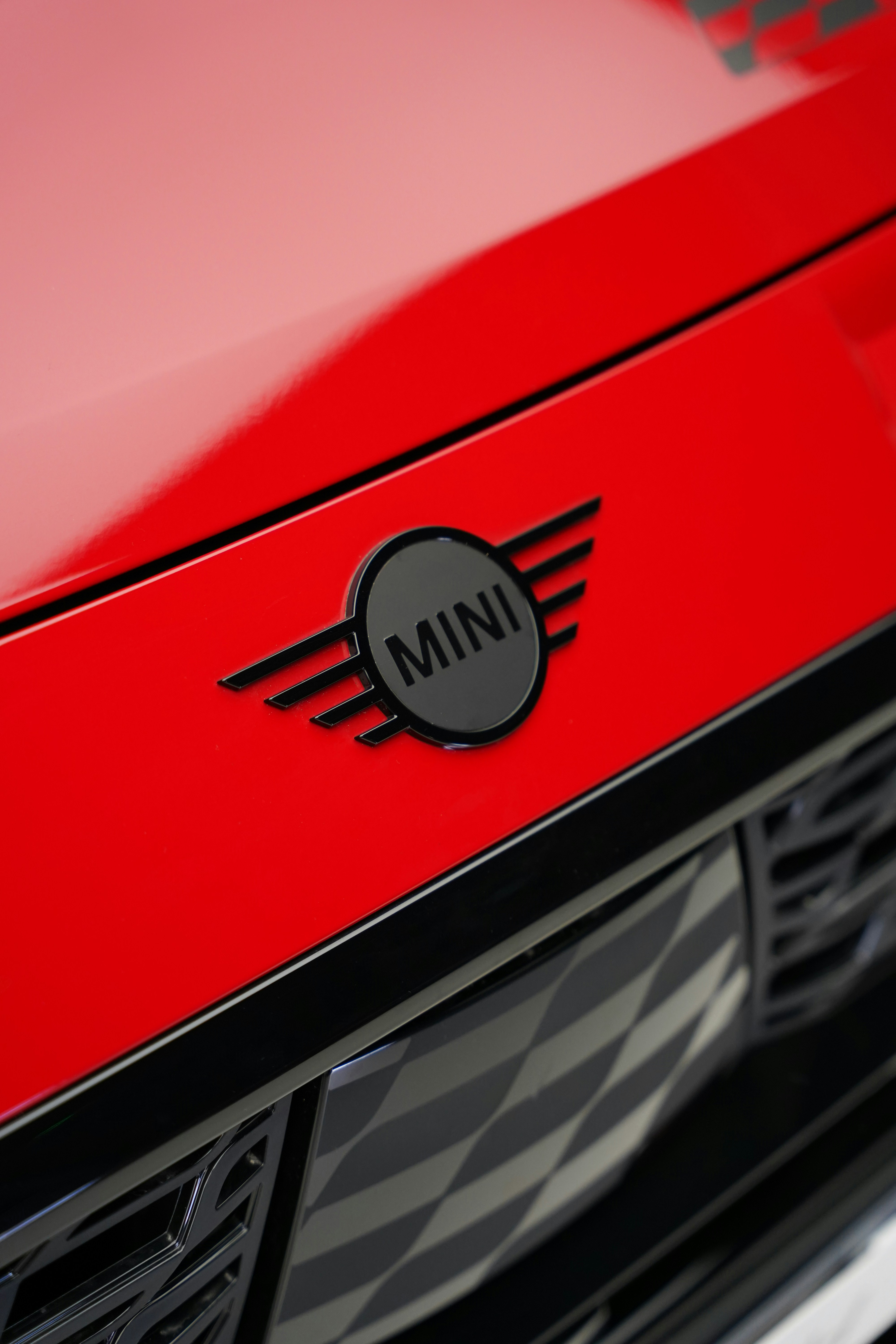 The Iconic Emblem of Mini: A Bold Statement in Red