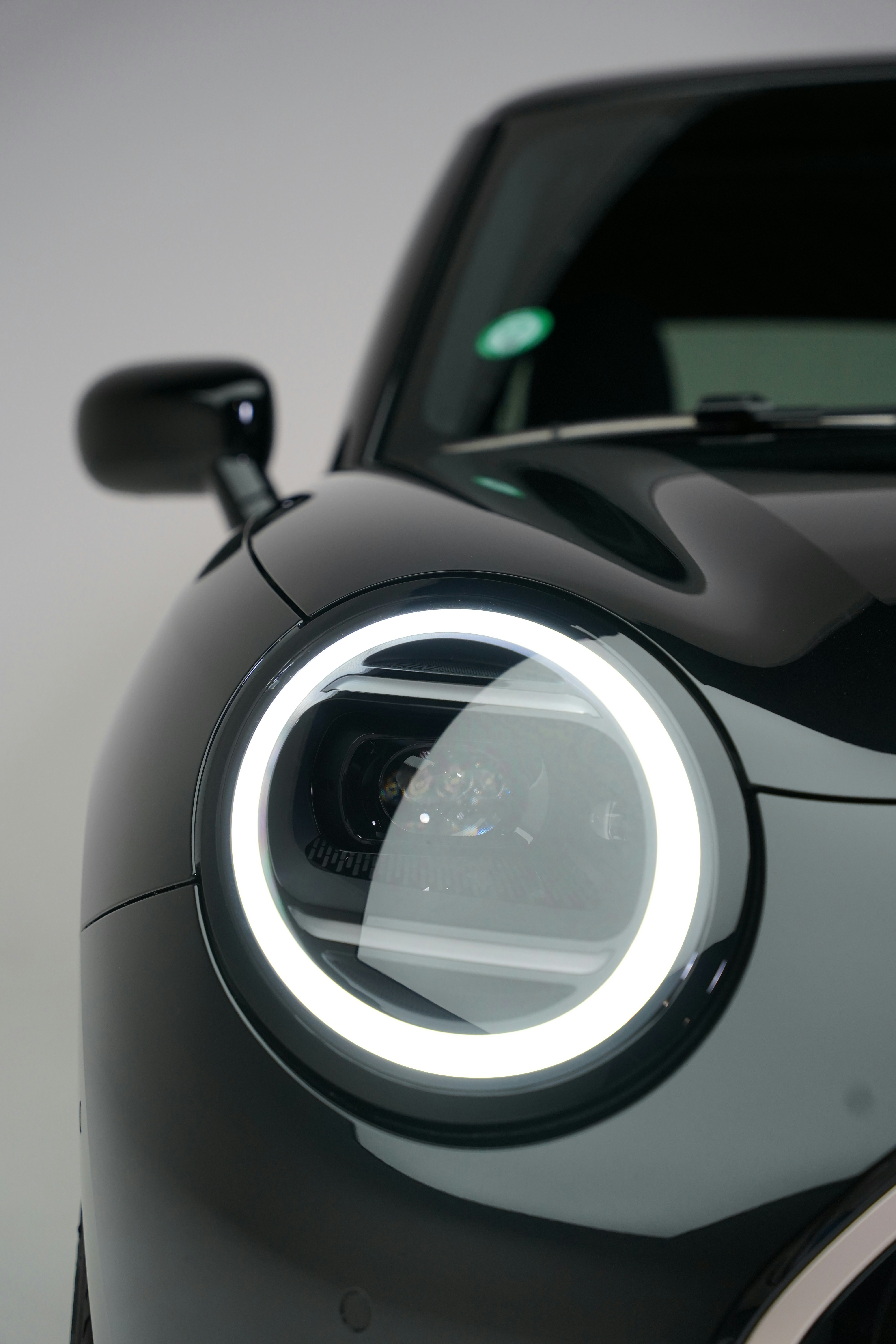 Halo Ring Focus: Close-Up of a Modern Sports Car Headlamp