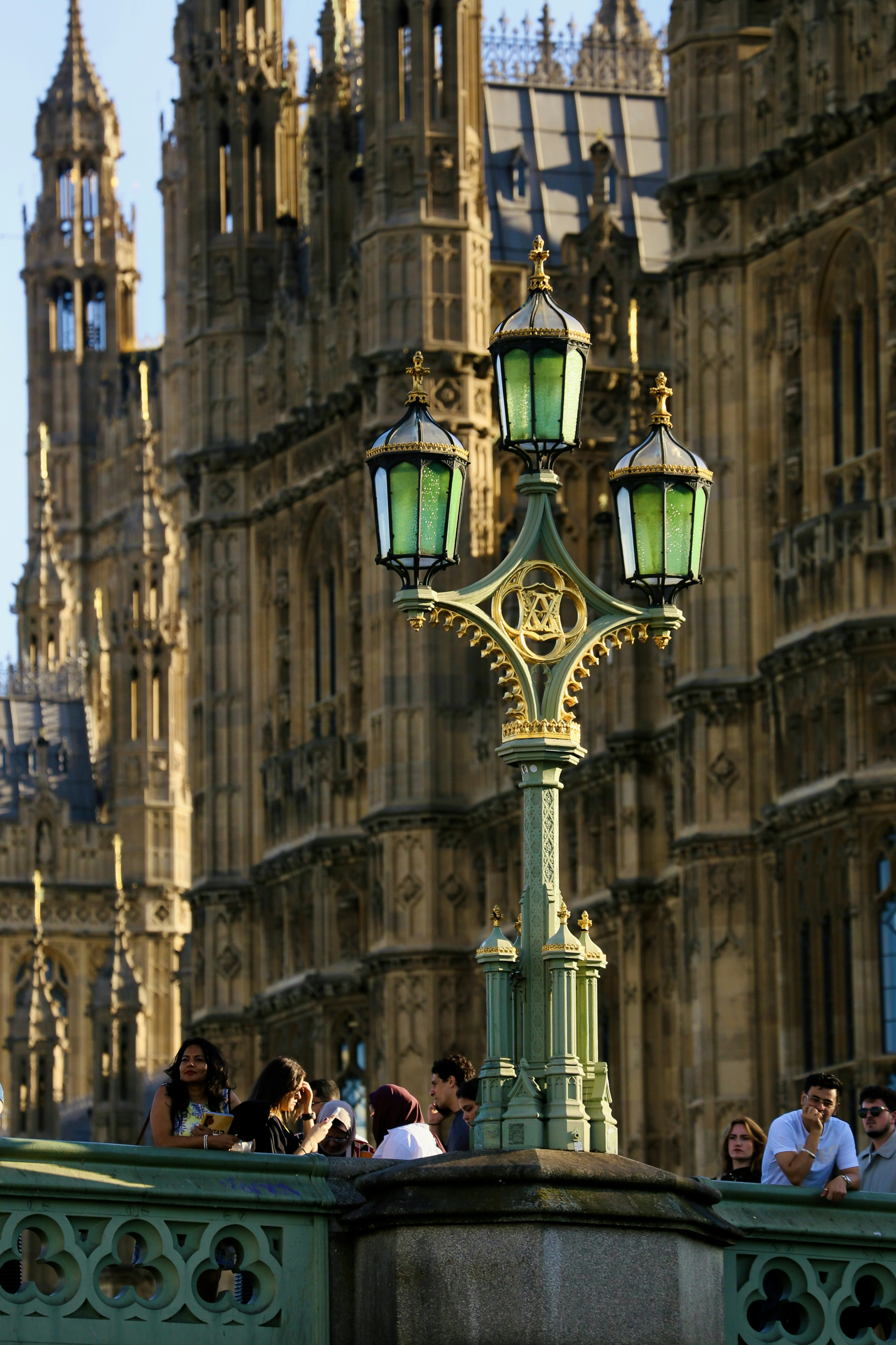 Emerald Lanterns Framing Westminster's Gothic Facade