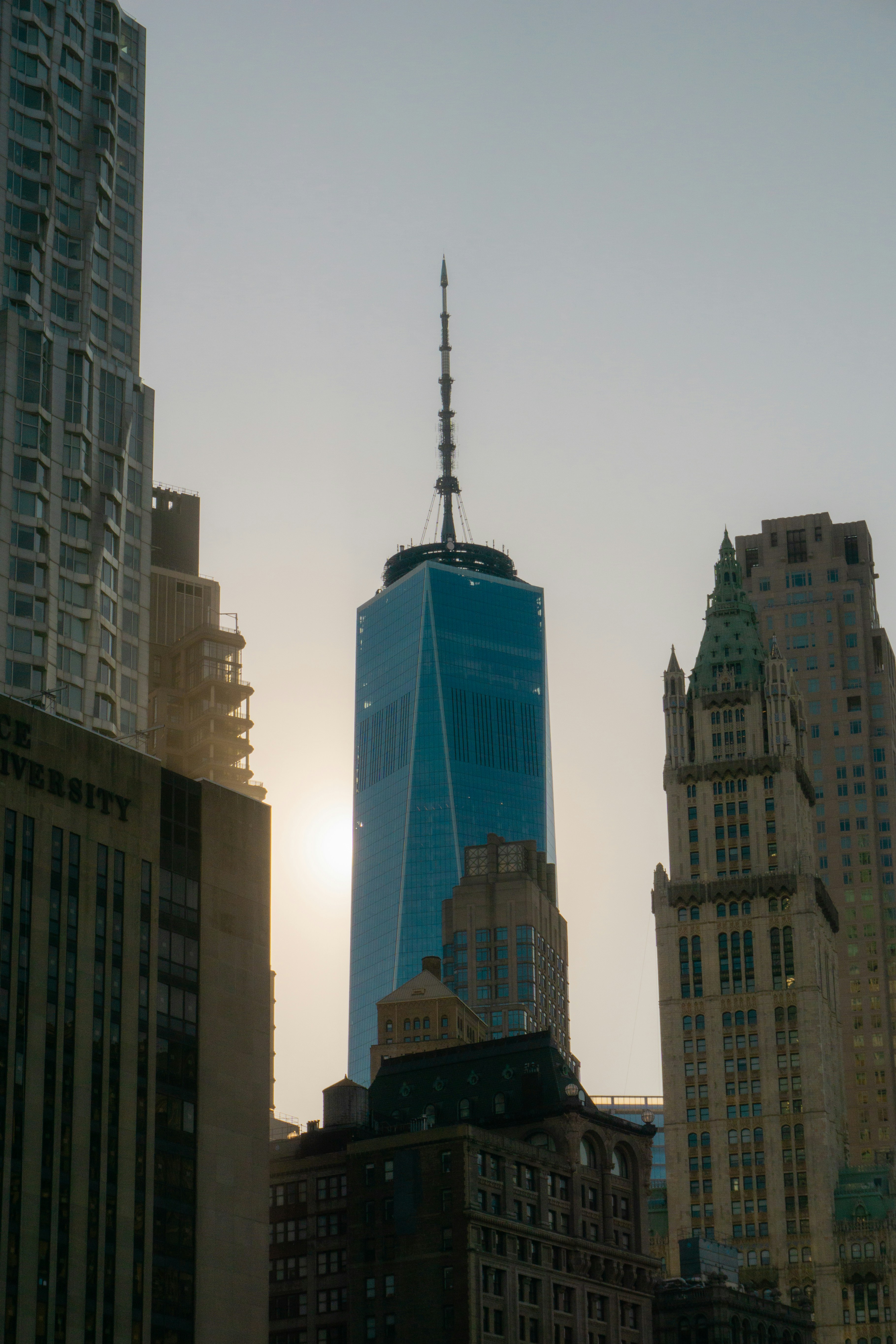 Skyscrapers in a city skyline at sunset