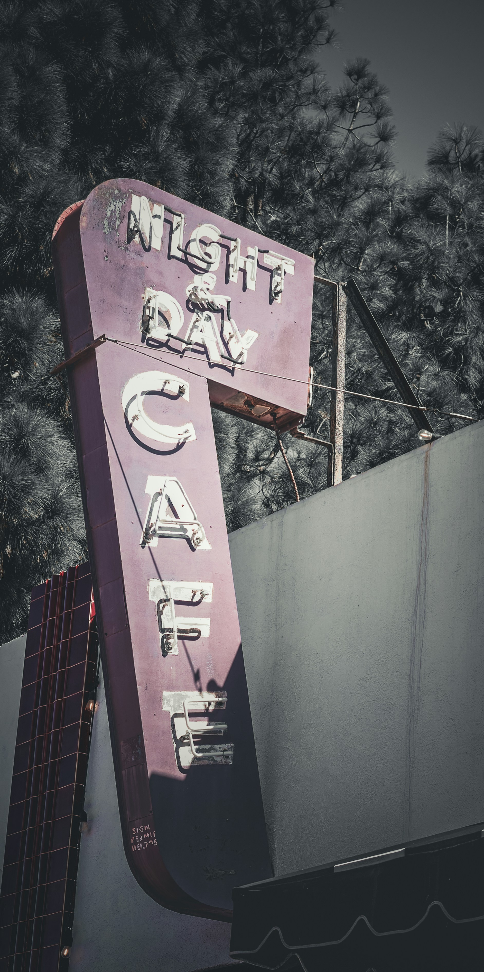 Eternal Glow of the Night & Day Café Signage