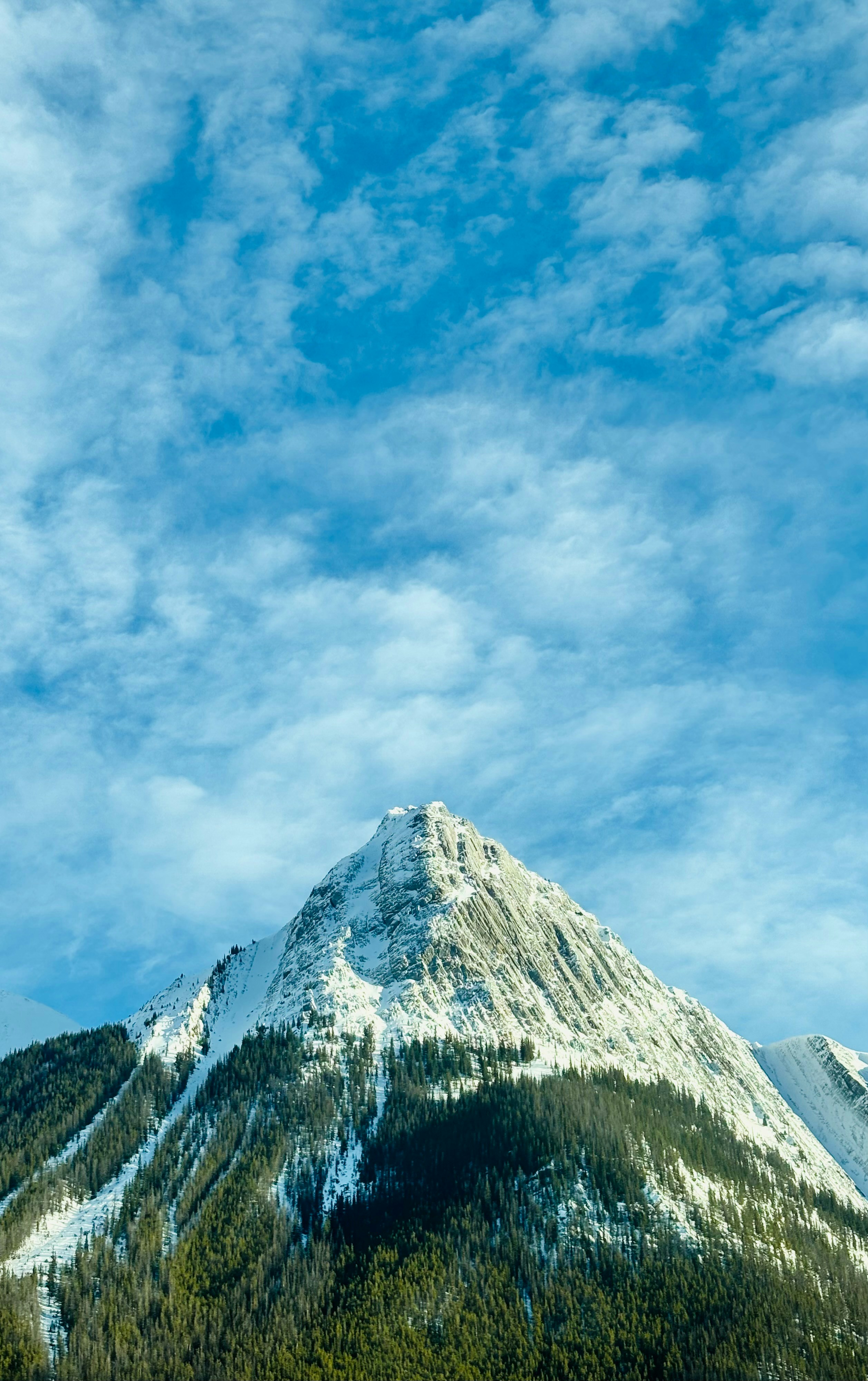 The Pinnacle of Serenity: A Snow-Capped Majesty