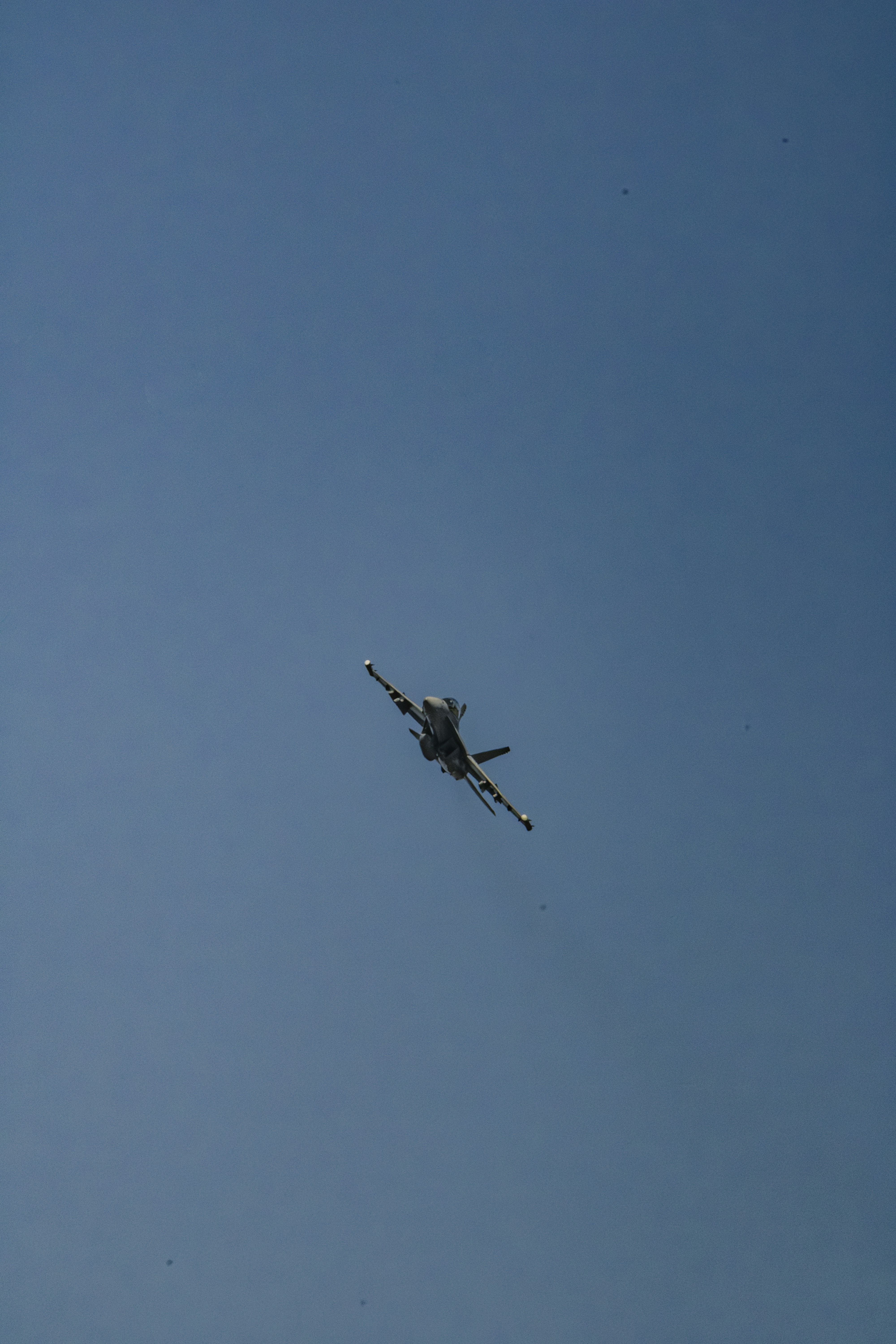 Soaring Through the Blue: A Jet's Ascendant Dance