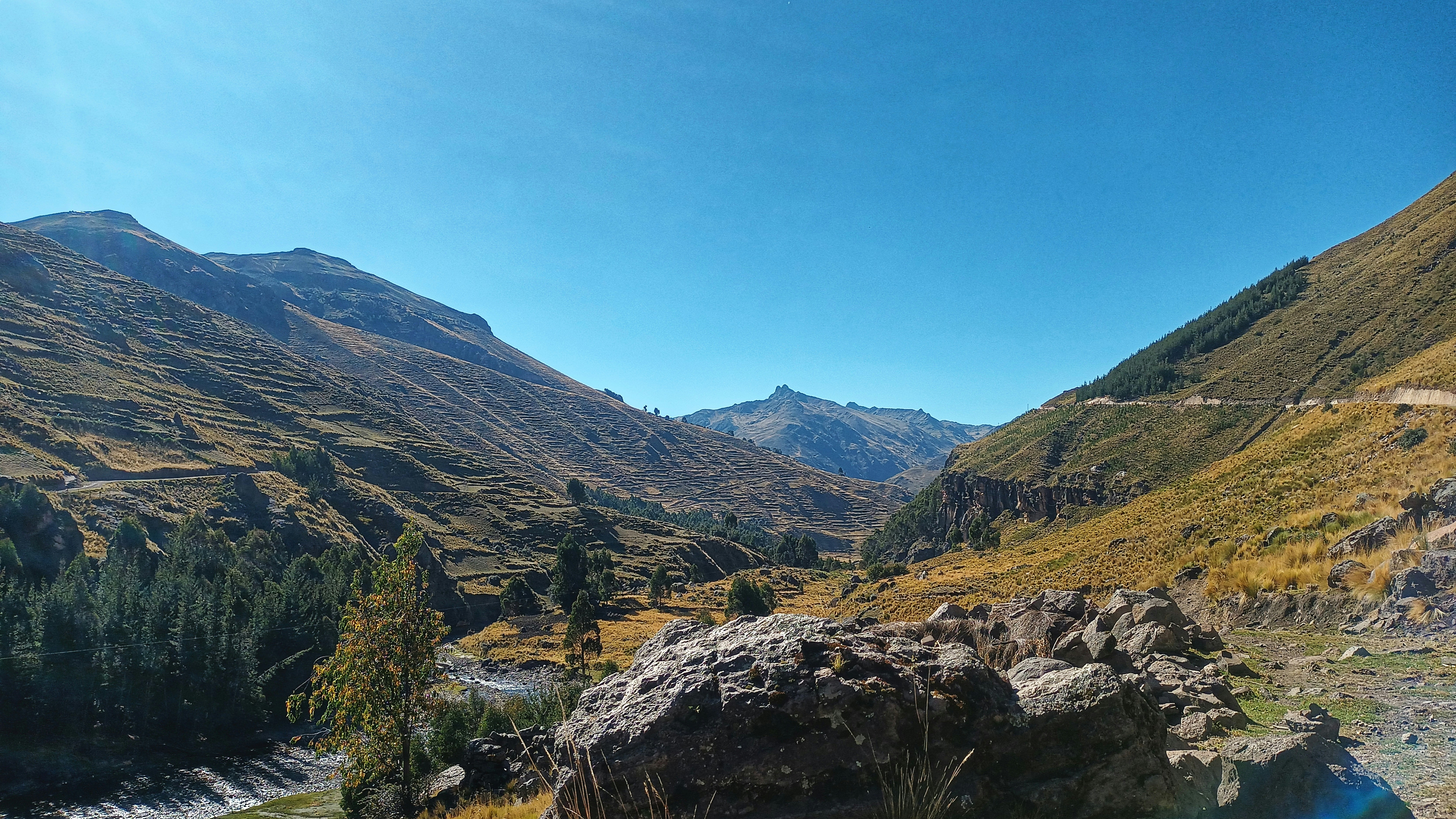 Majestic mountain valley under a clear blue sky