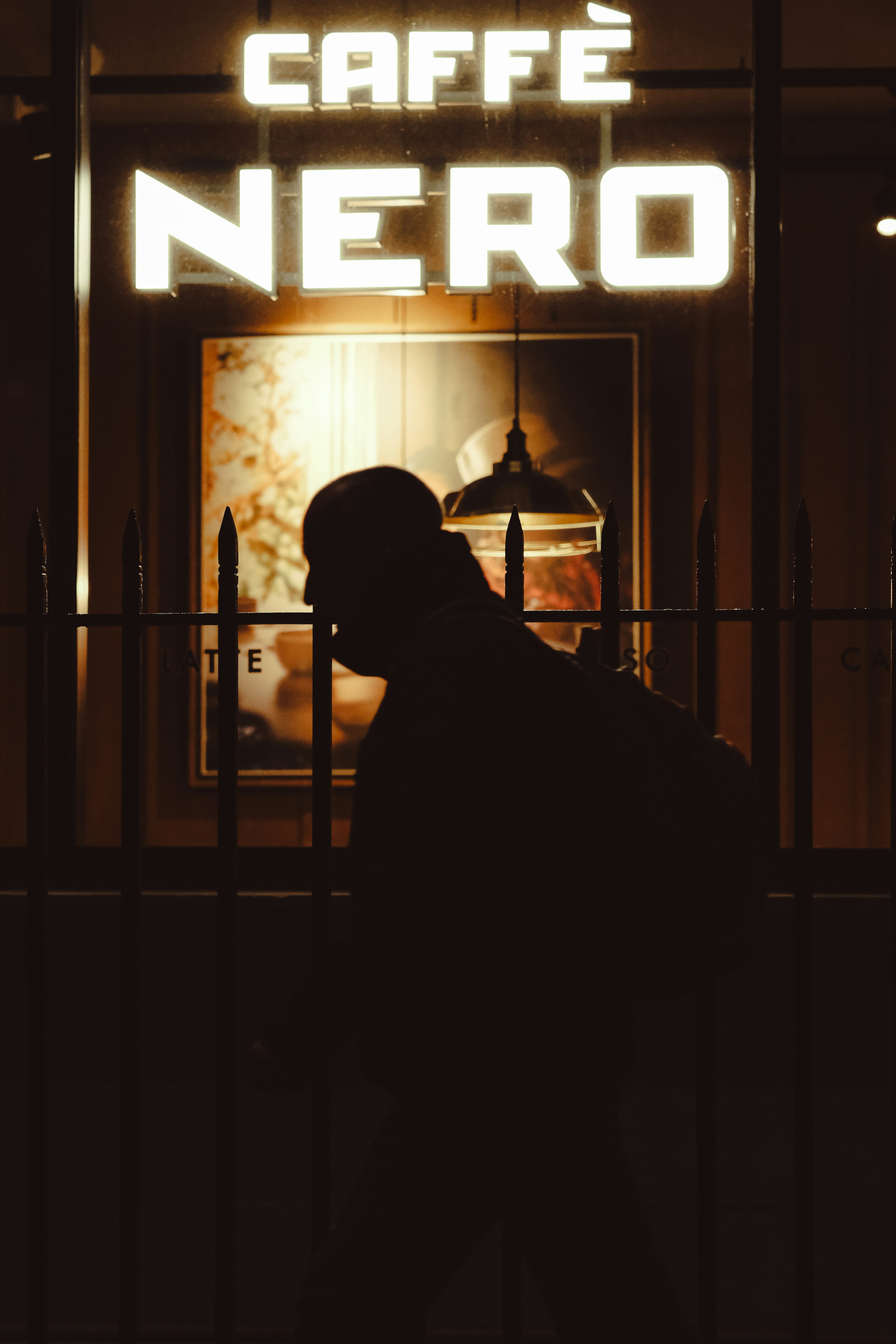 Silhouette Against the Urban Glow
