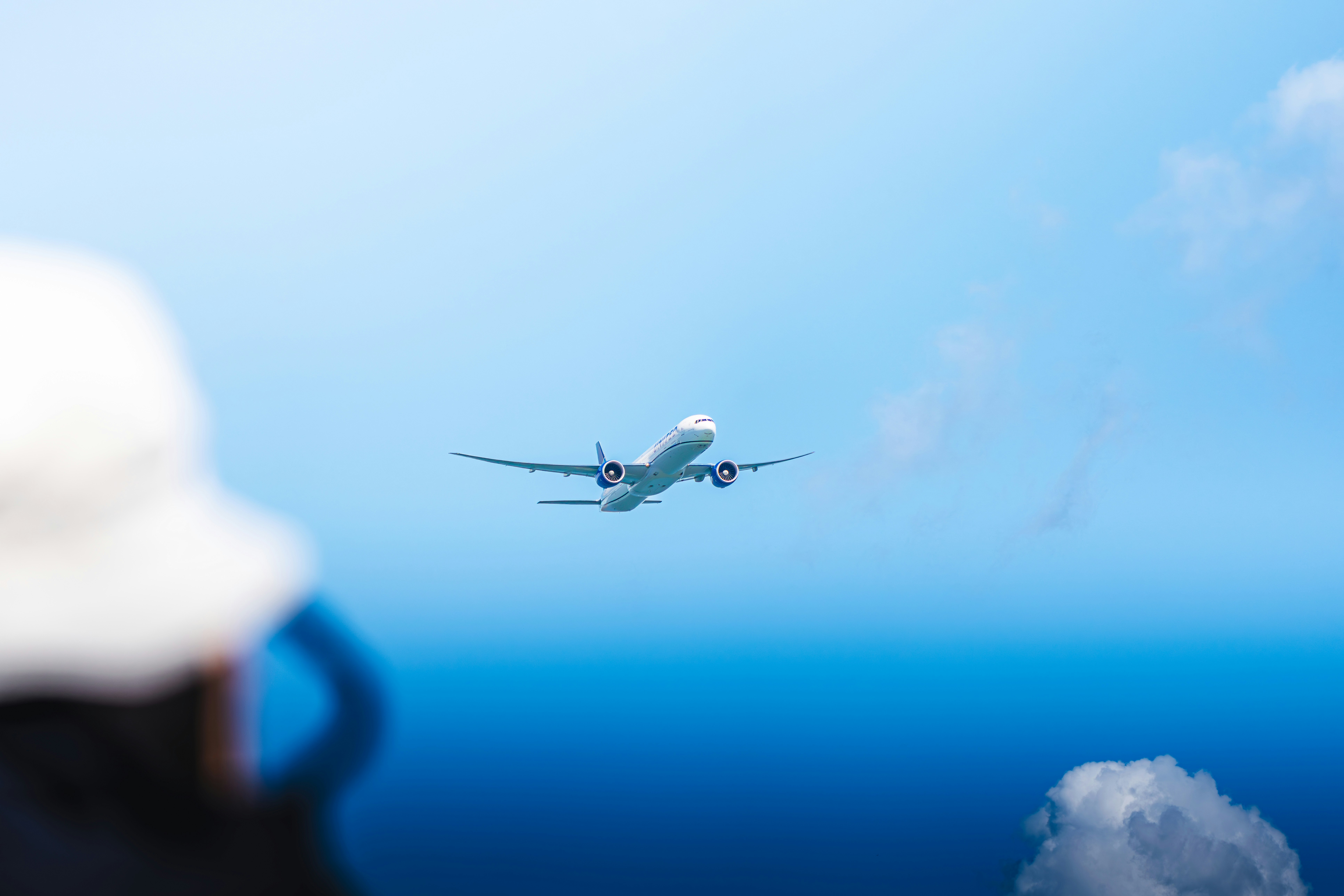 United Airlines Boeing 777 Passover POV View during its demo performance for SF Fleet Week 2025 | Airplane flying over the ocean with clouds and ocean