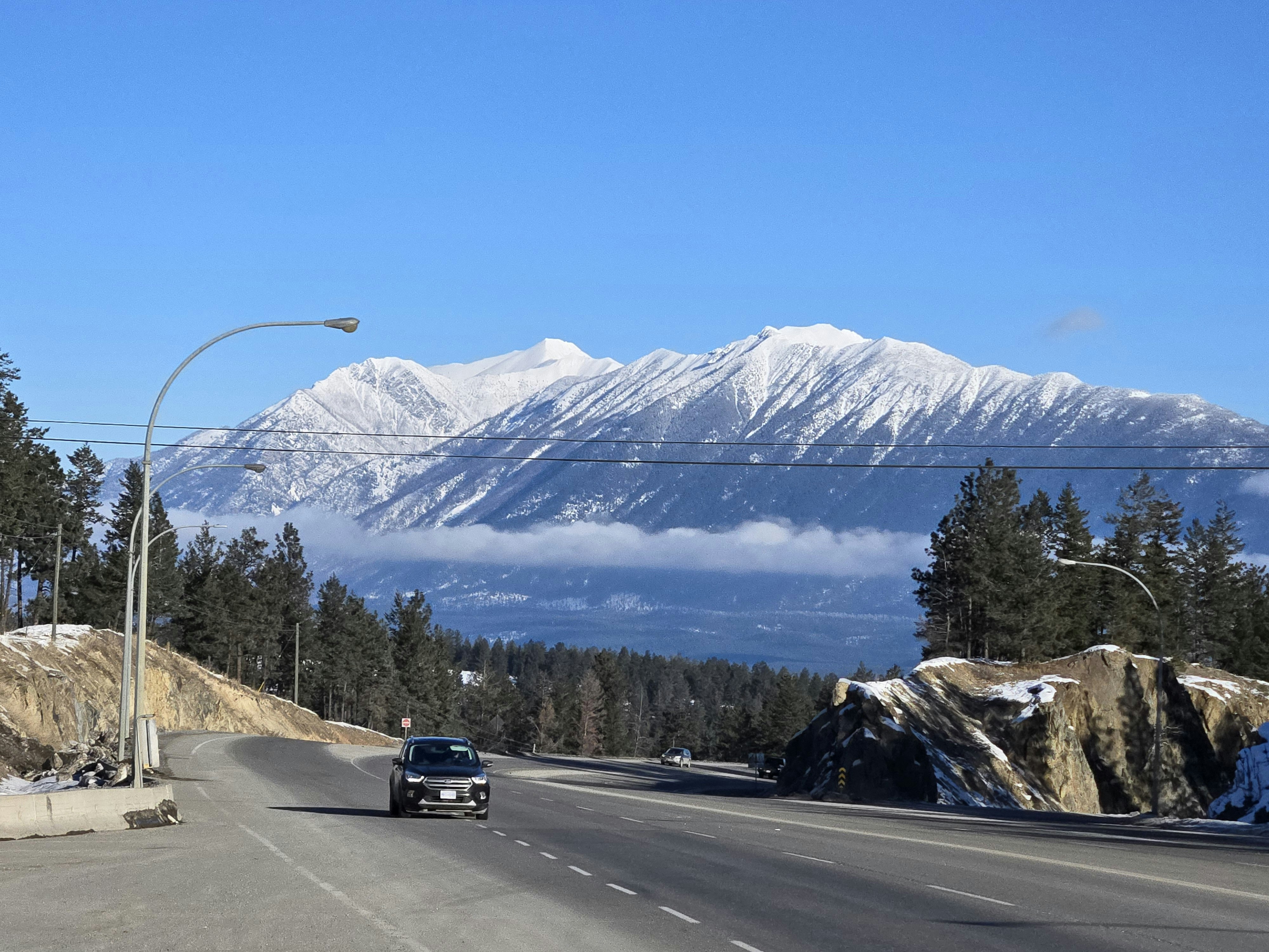 Snowbound Summit Highway: A Quiet Drive Beneath Majestic Peaks