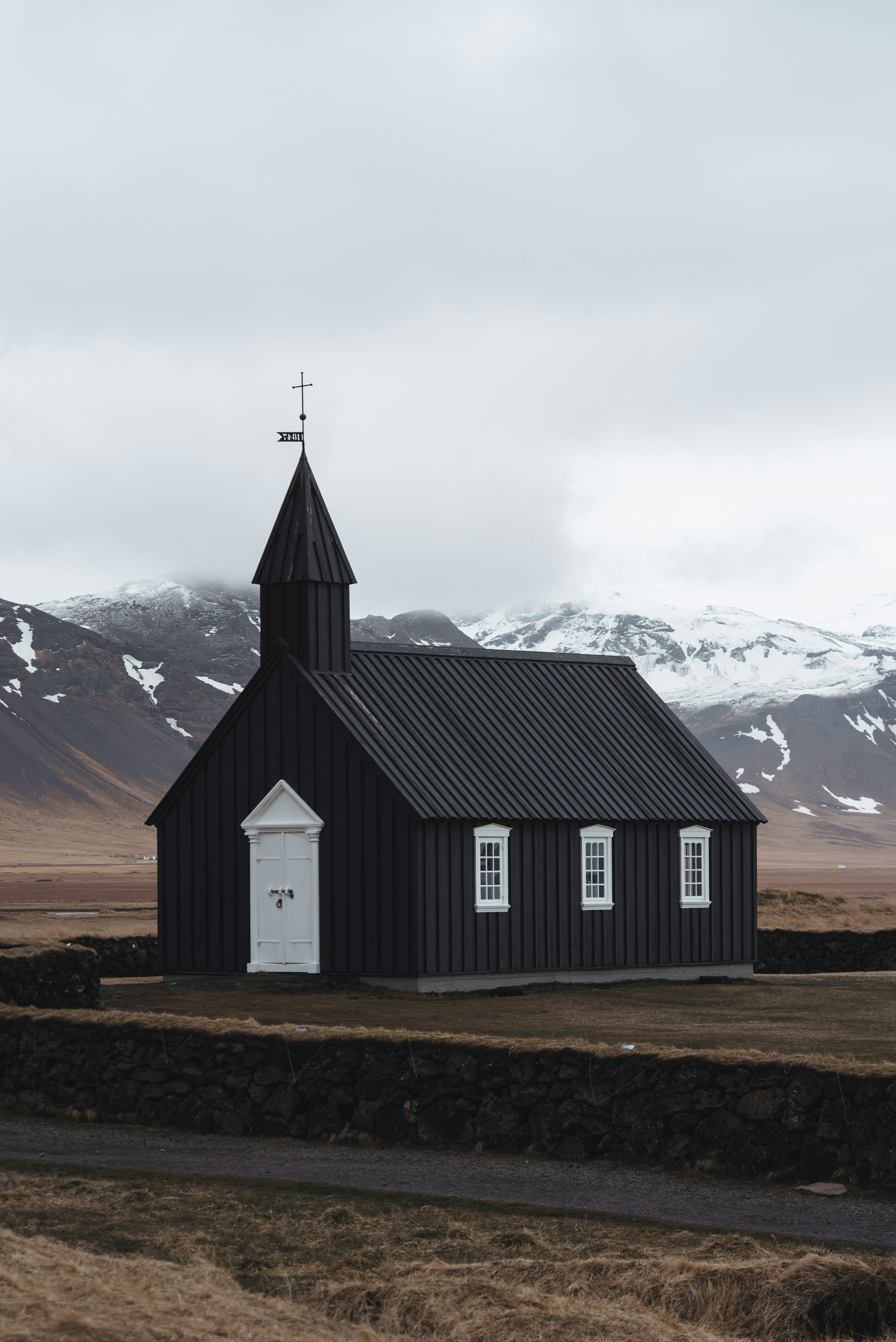 Solitary Sanctuary Amidst Majestic Peaks