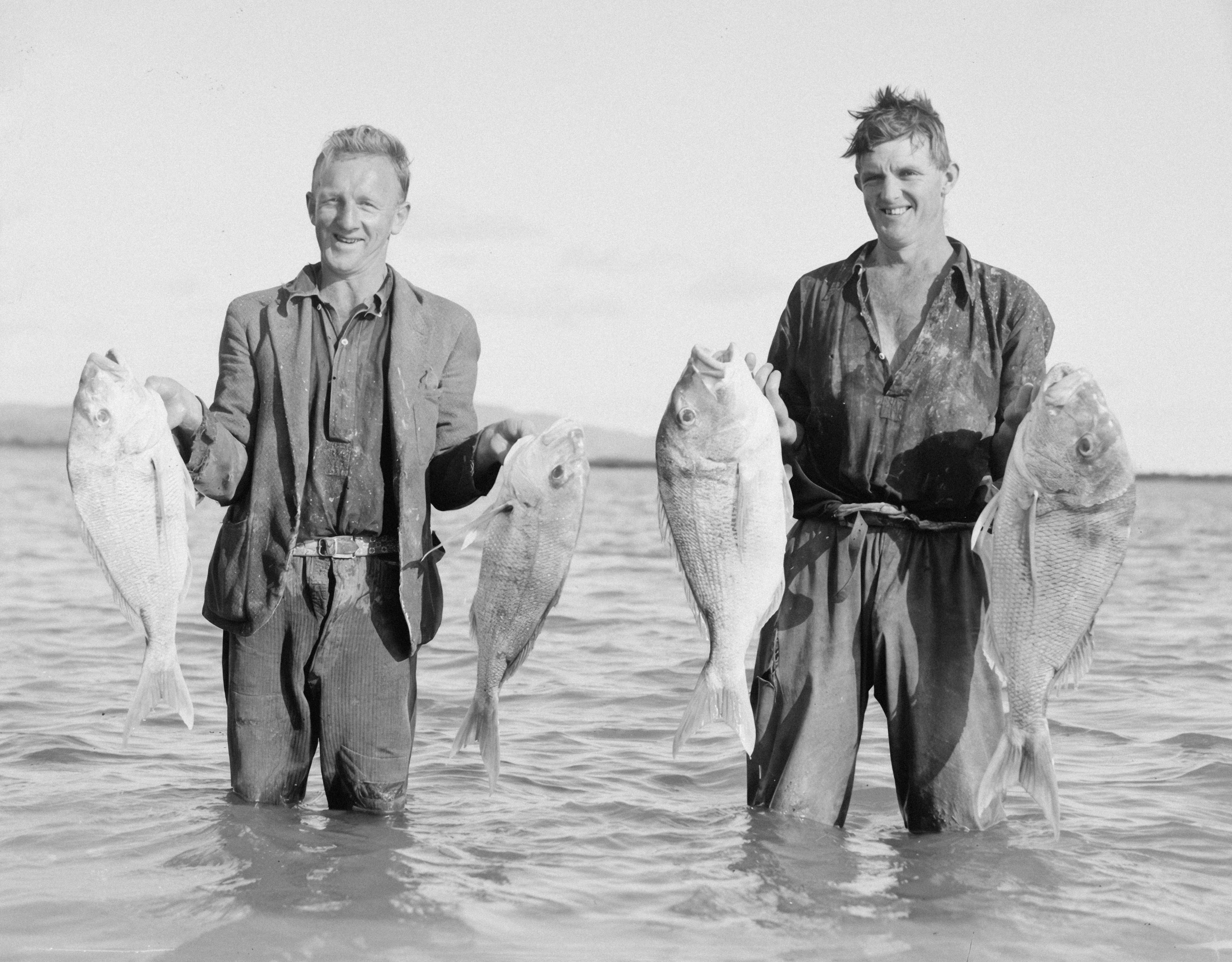 Shallow-Water Triumph: Twin Anglers Parade a Riverful Haul