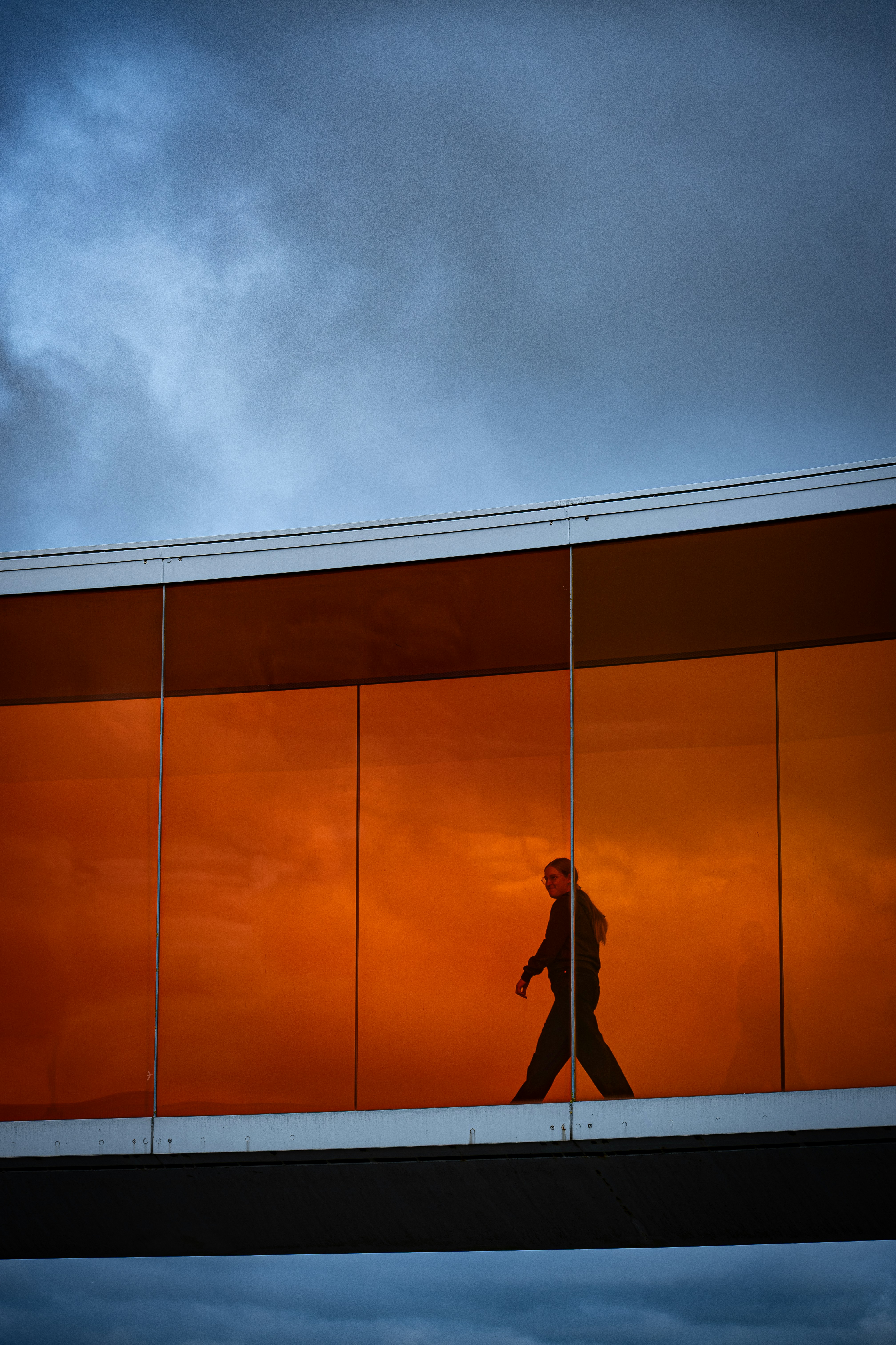 Ember-Glass Skywalk: A Solemn Walk Above the Blue Expanse