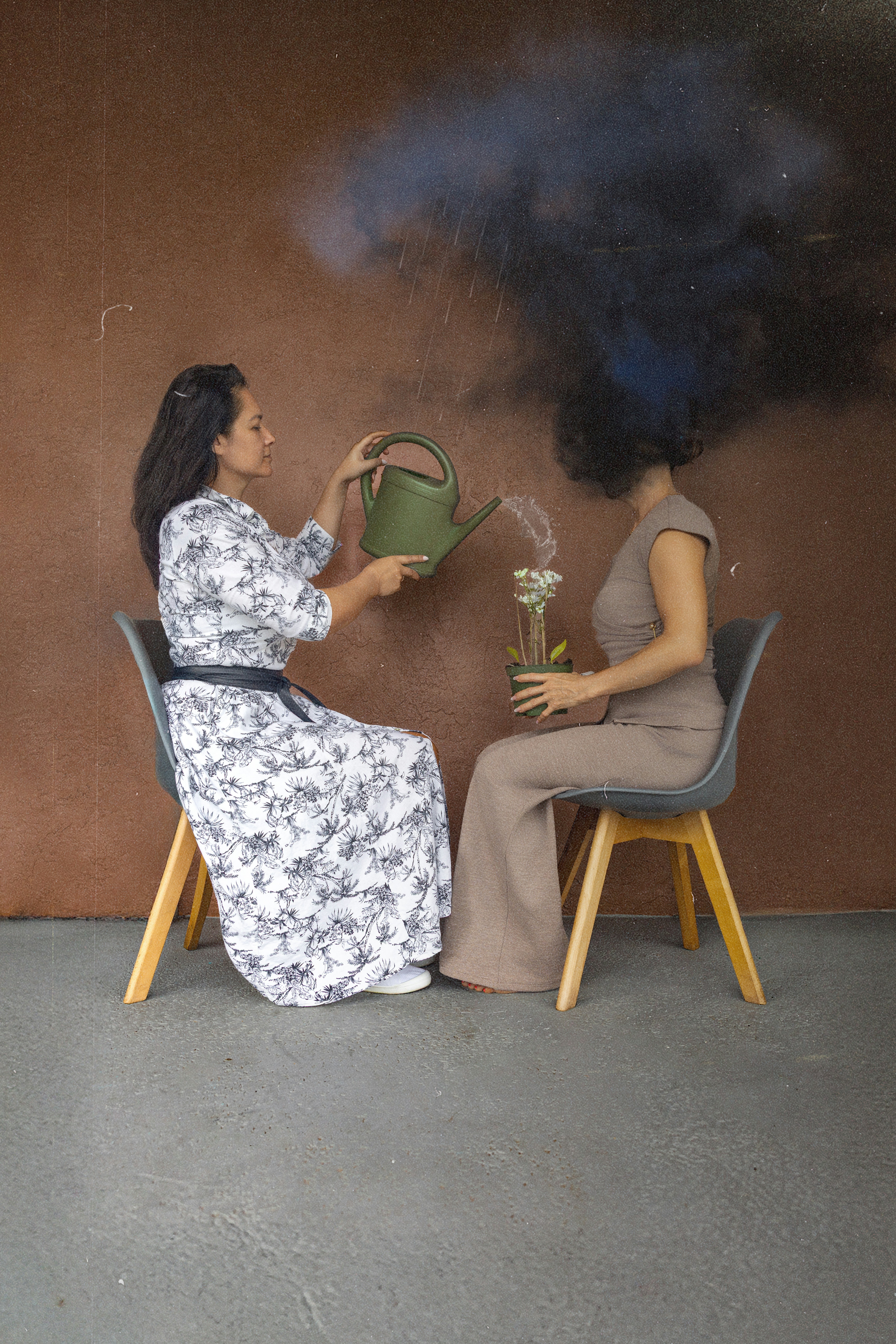 Watering Smoke: A Surreal Studio Tableau of Two Women