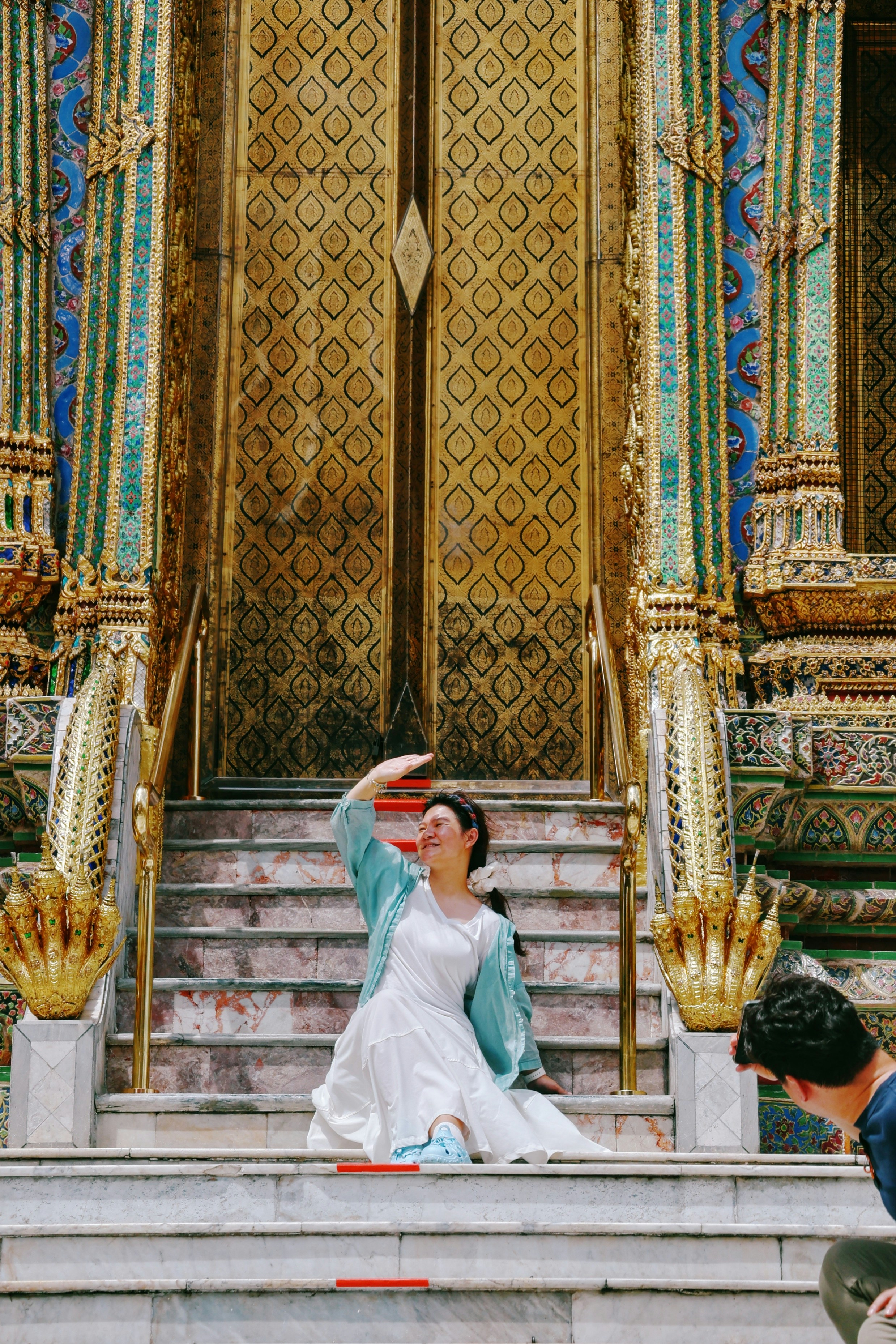 Golden Threshold: A Quiet Portrait on Opulent Steps