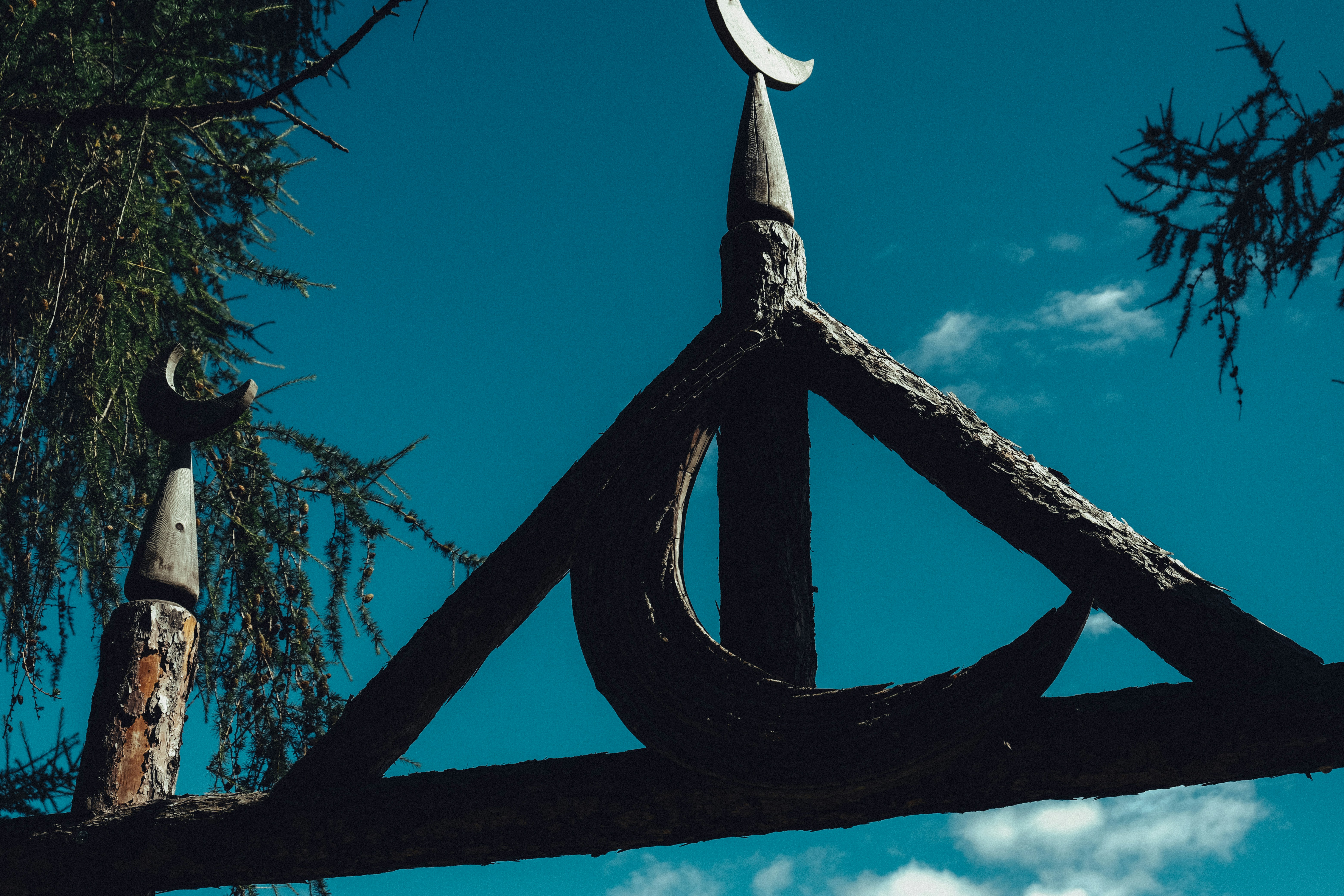 Crescent-Topped Arch Framed Against Sky