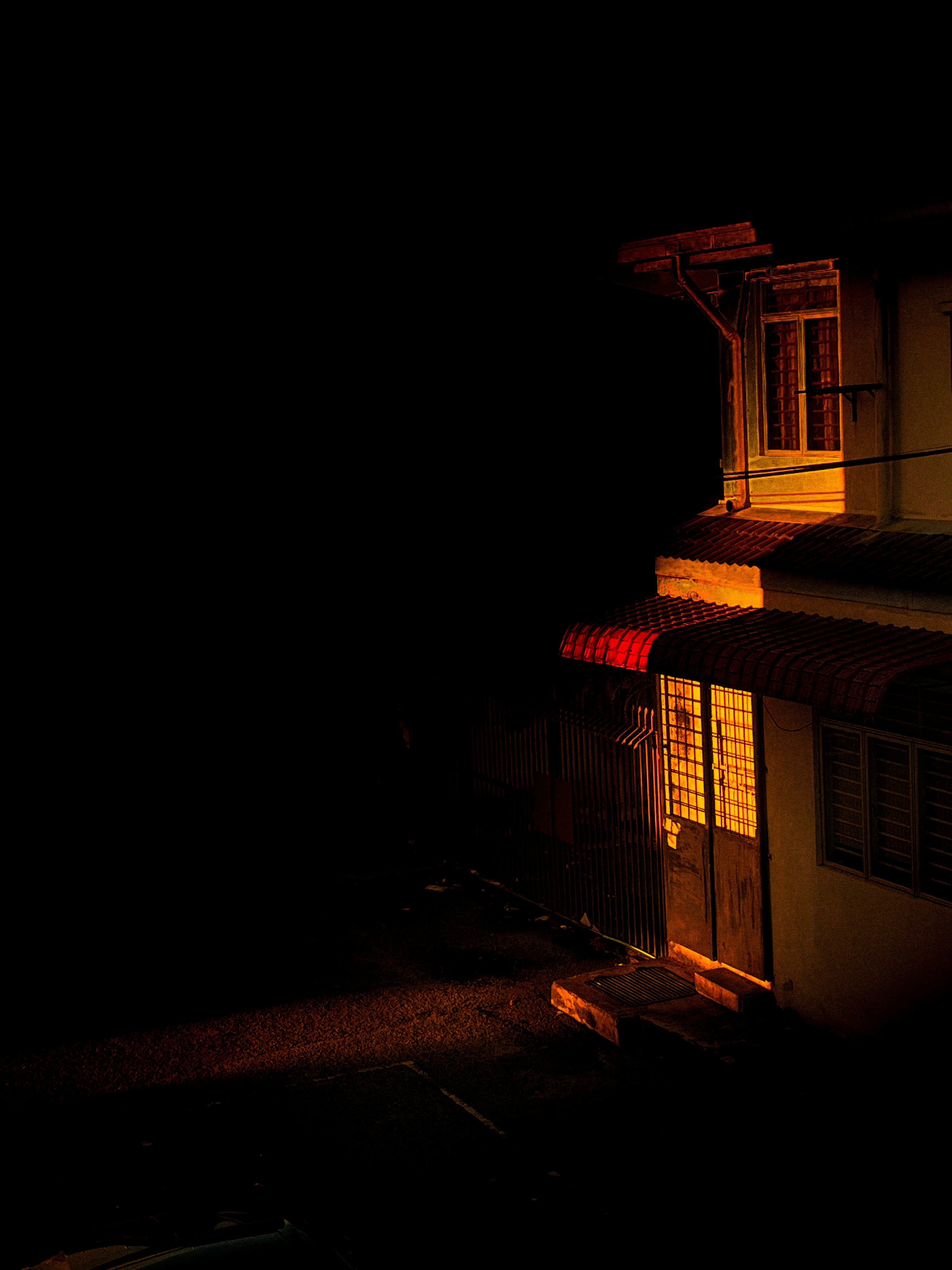 Amber Windowlight on a Quiet Night Facade