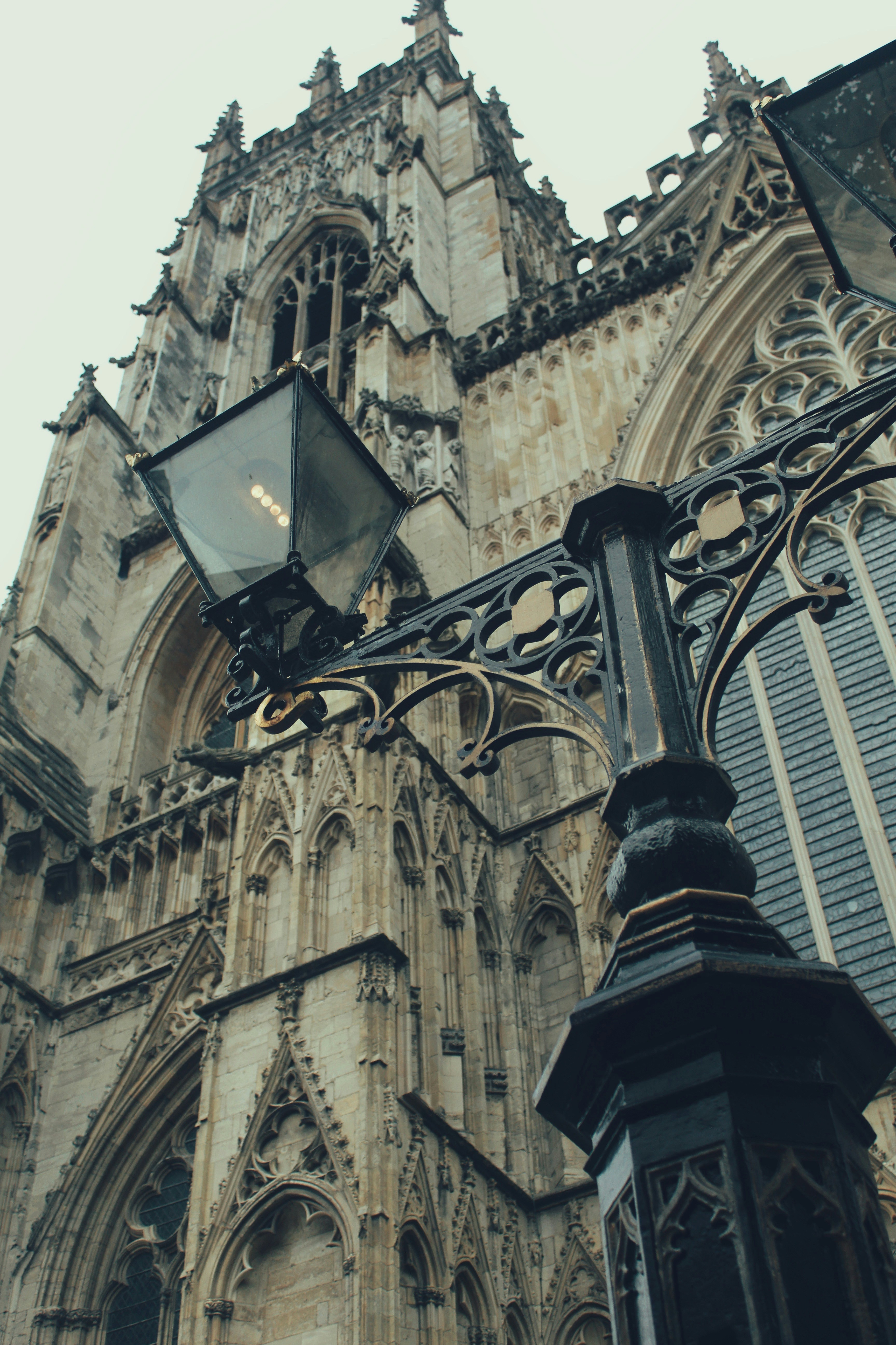 Gothic Grandeur: A Lantern Basks the Cathedral Facade