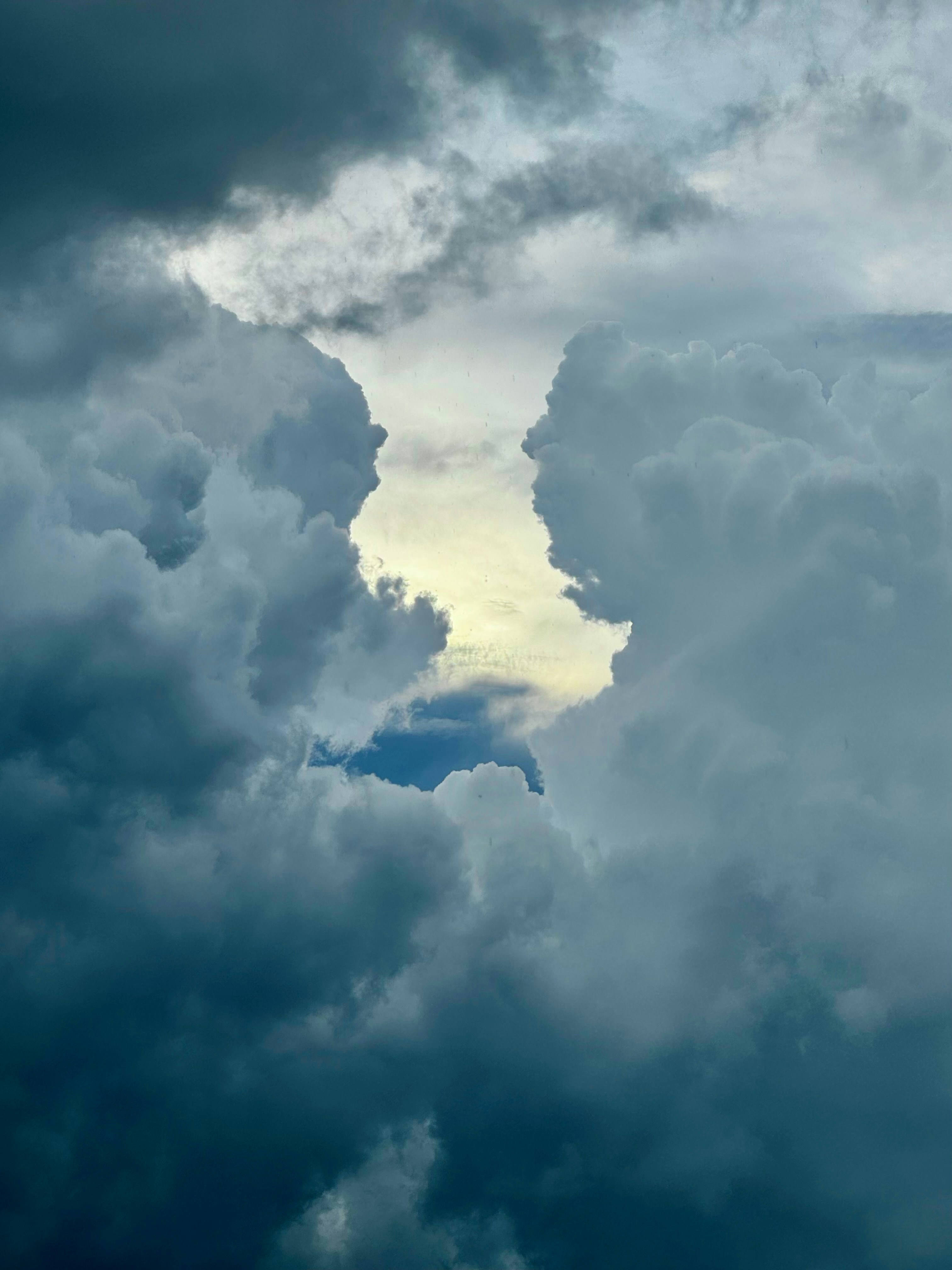Dramatic clouds with a break of sunlight
