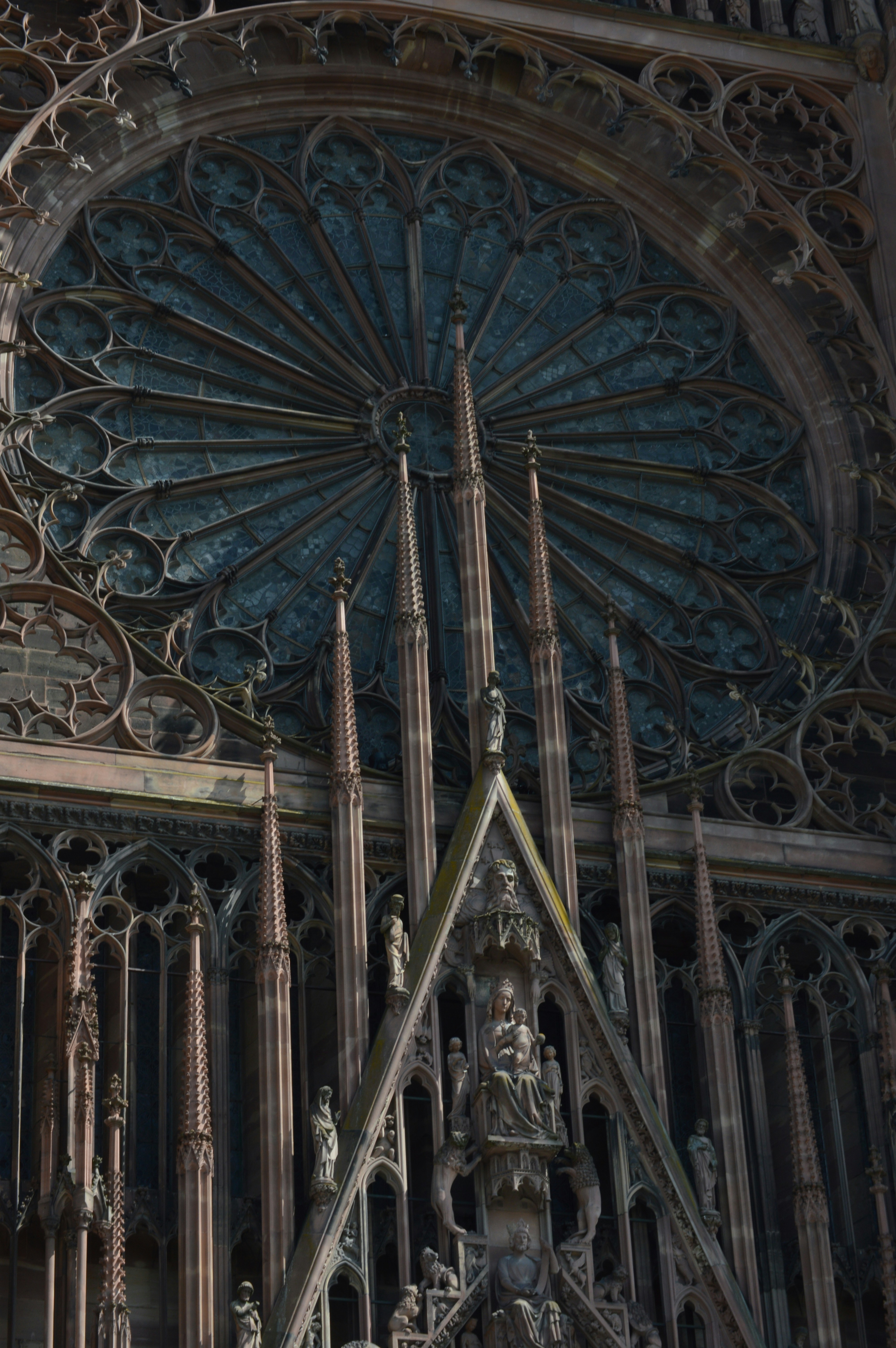 Intricate gothic architecture with a large rose window.