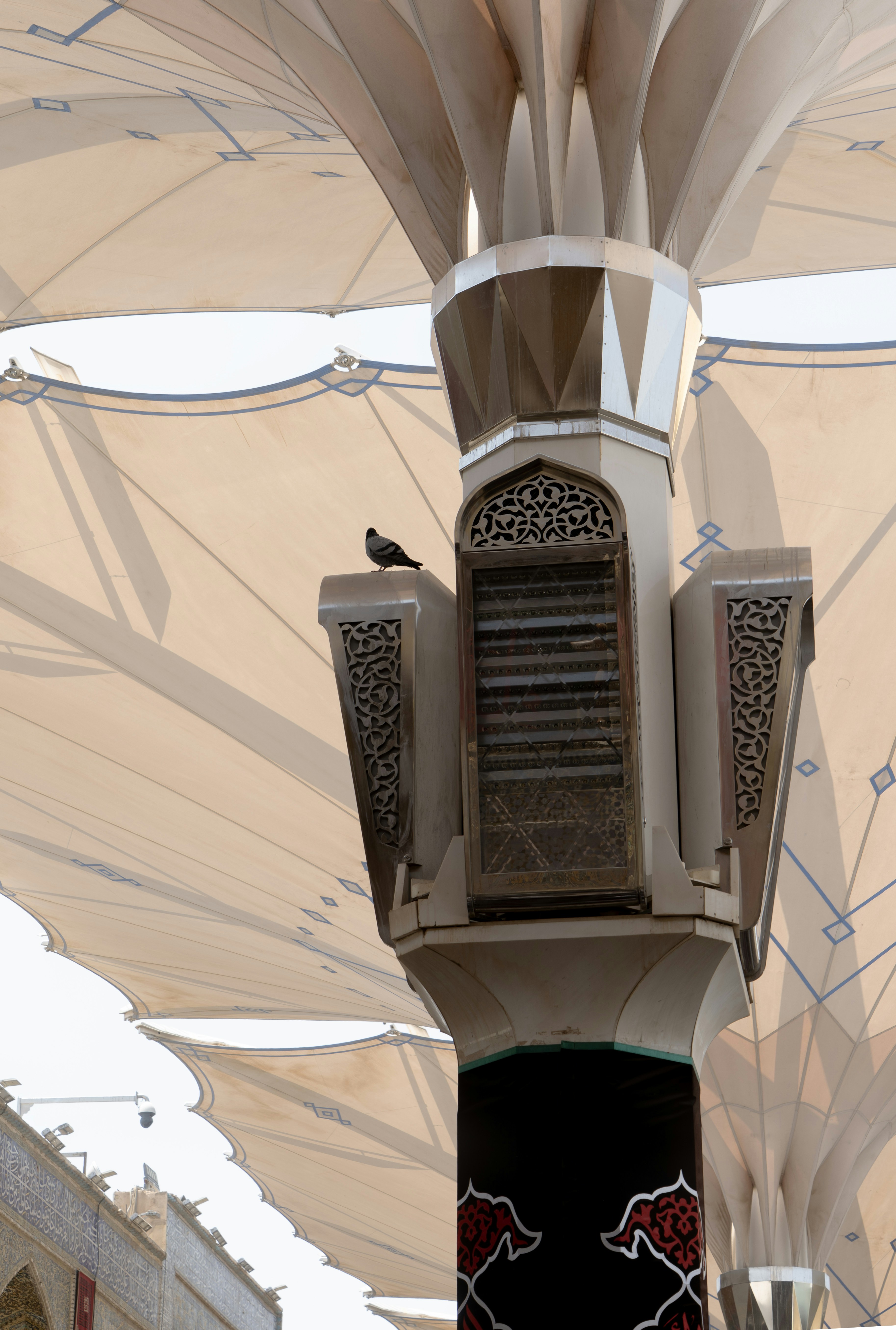 Anchor of Light: Bird on an Ornate Lantern Beneath Sail-Like Canopies