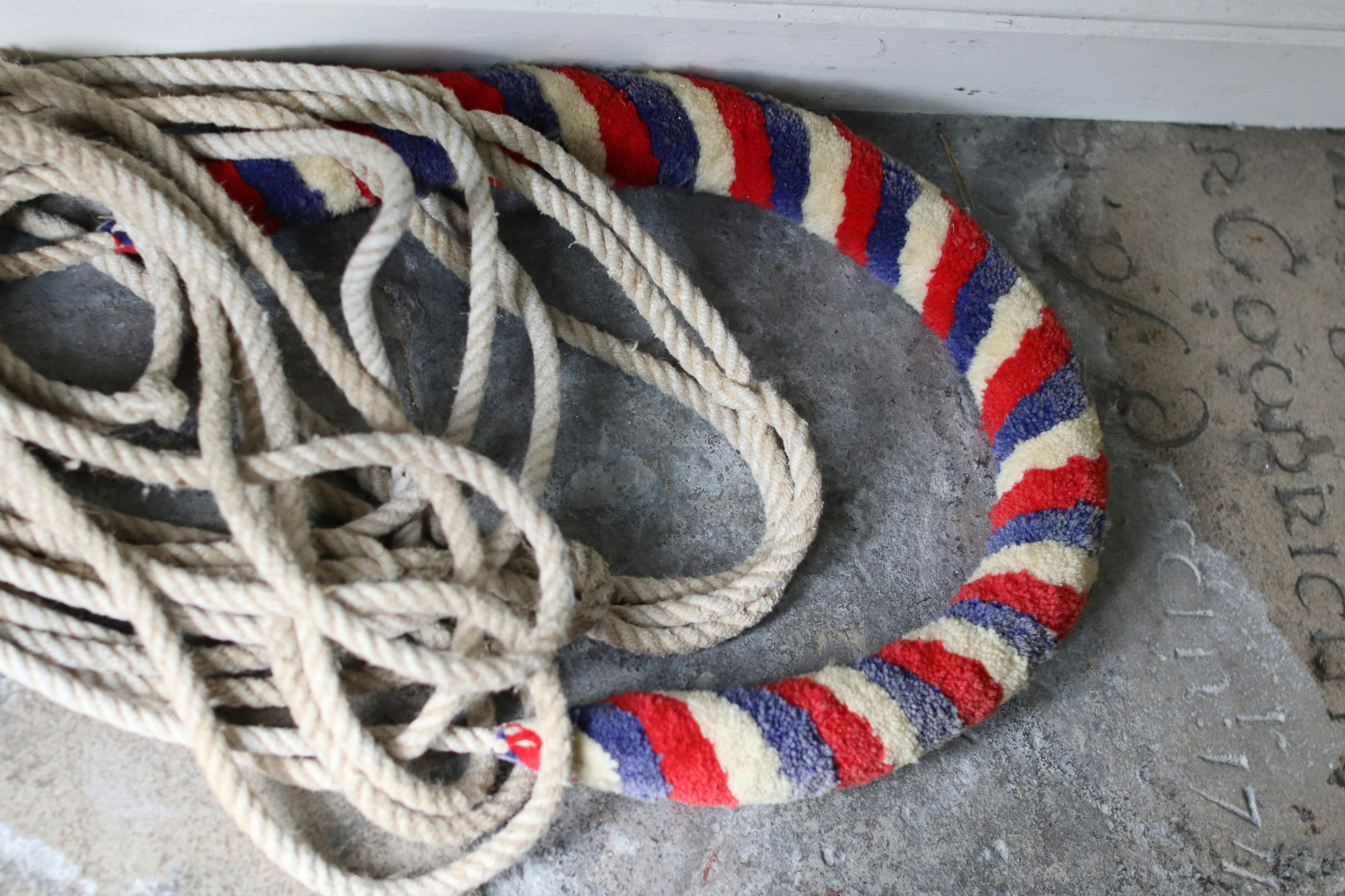 Coiled rope with red, white, and blue stripes