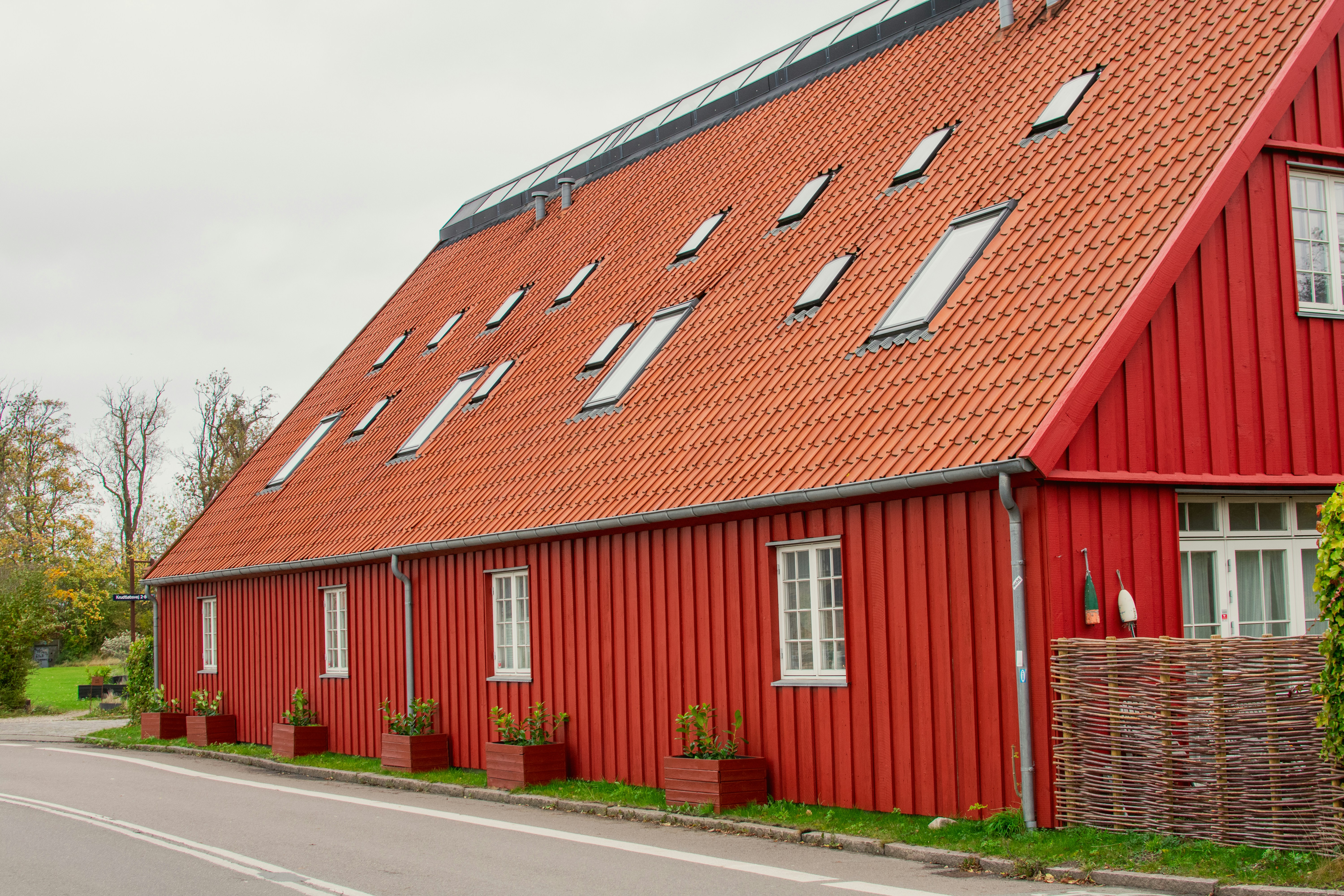 Rustic Charm: The Vibrant Red Abode