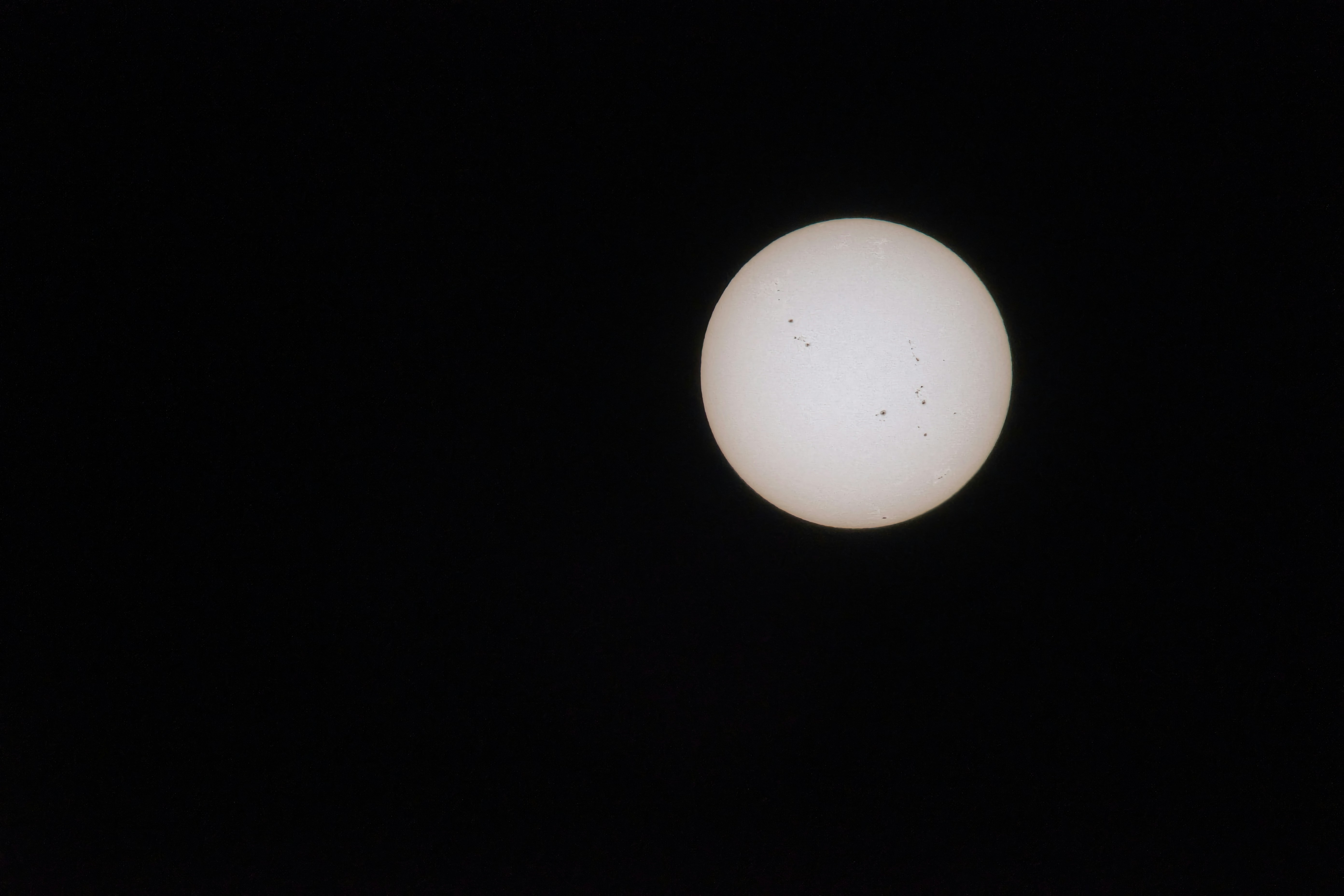 Sun / Sonne | The sun with dark sunspots against black background