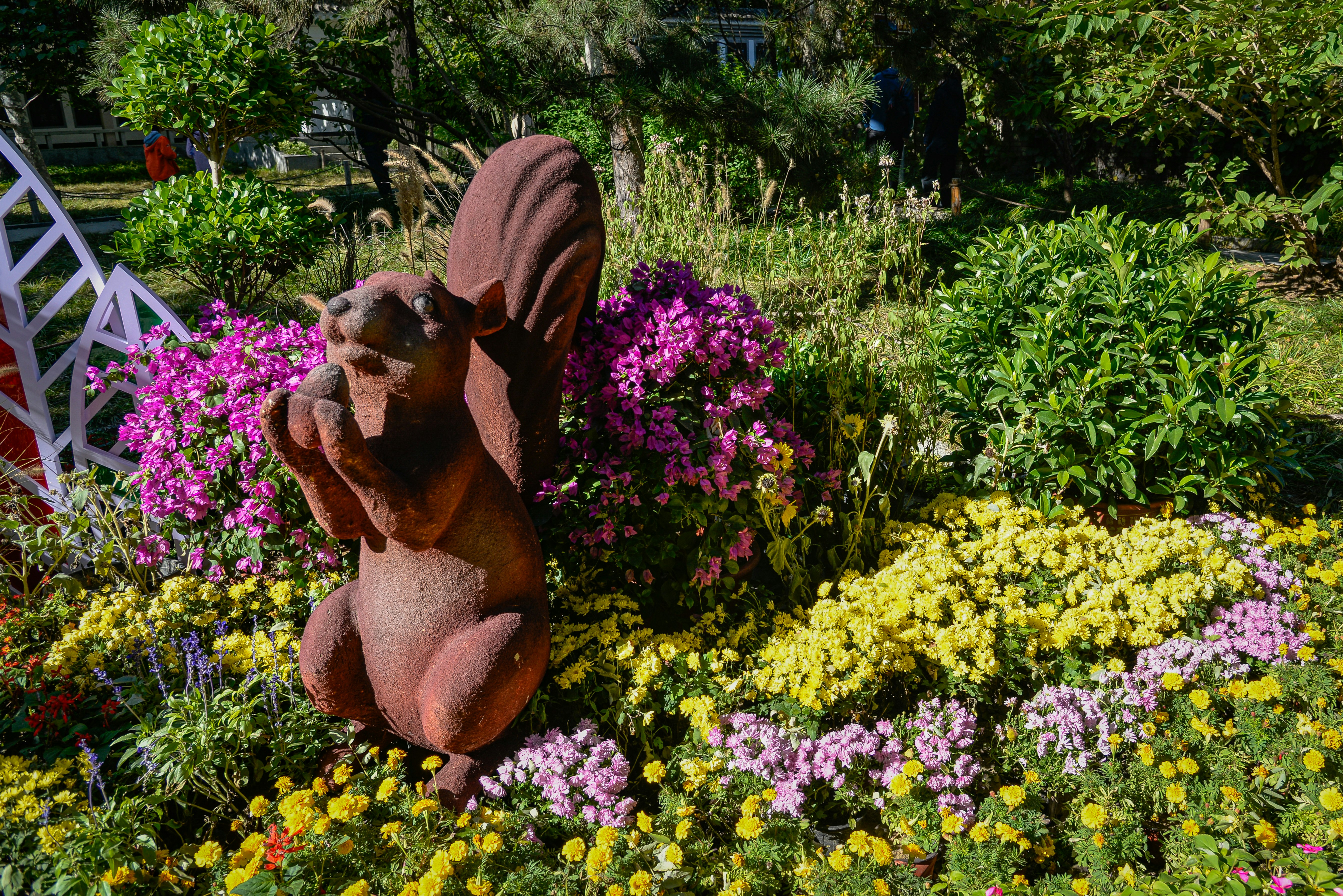 Sculpted Sentry Among Spring Verve