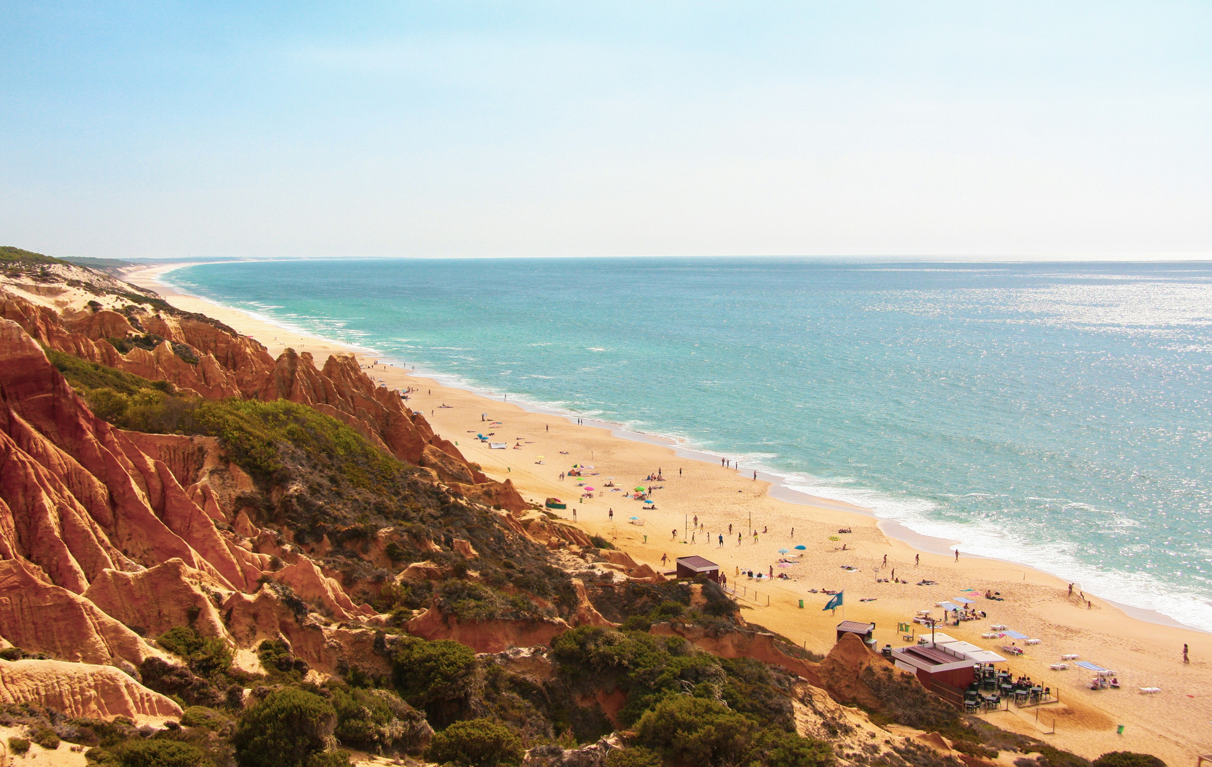 Golden Shores and Crimson Cliffs: A Coastal Retreat