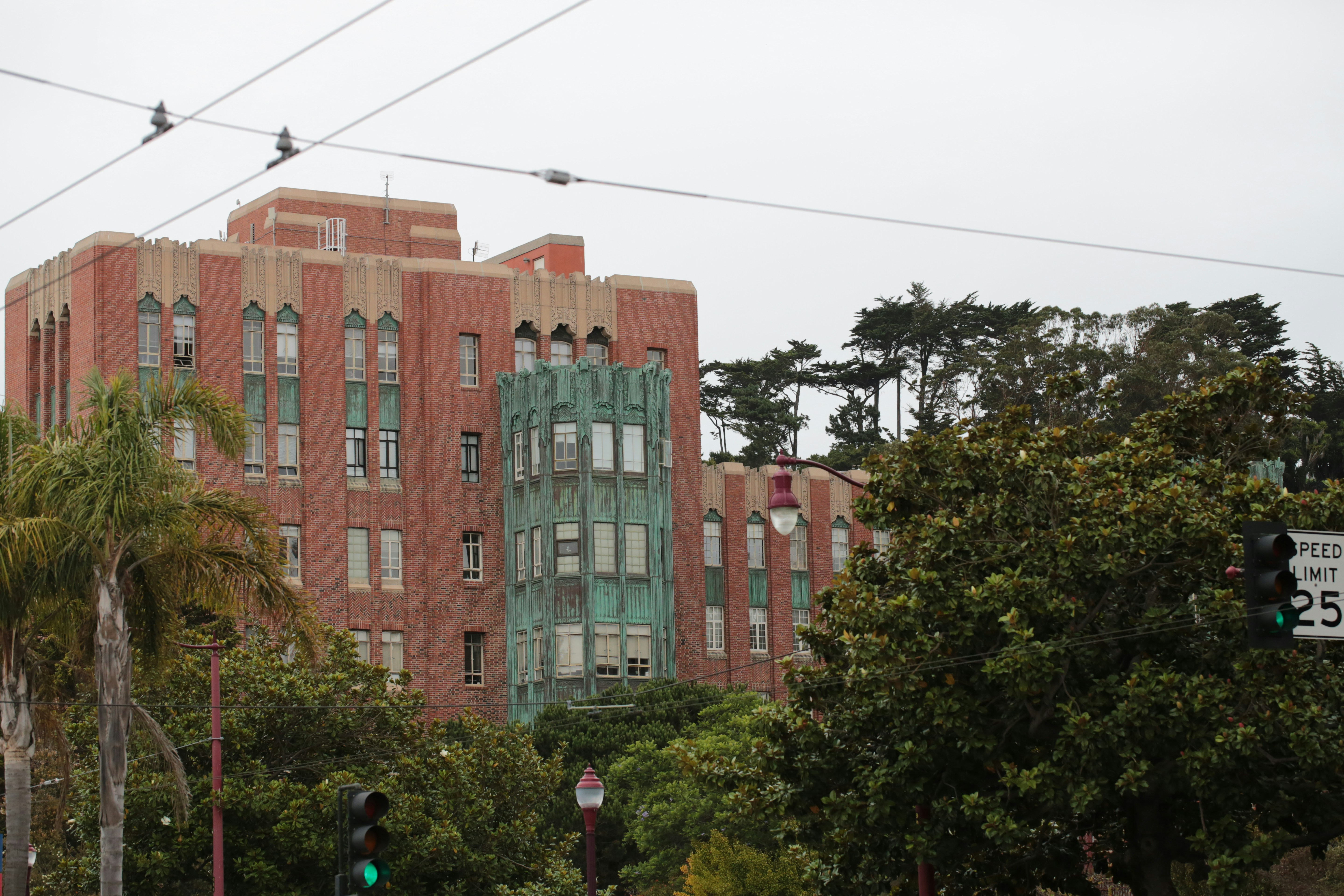 Brick Campus Towers Rising Above Urban Foliage