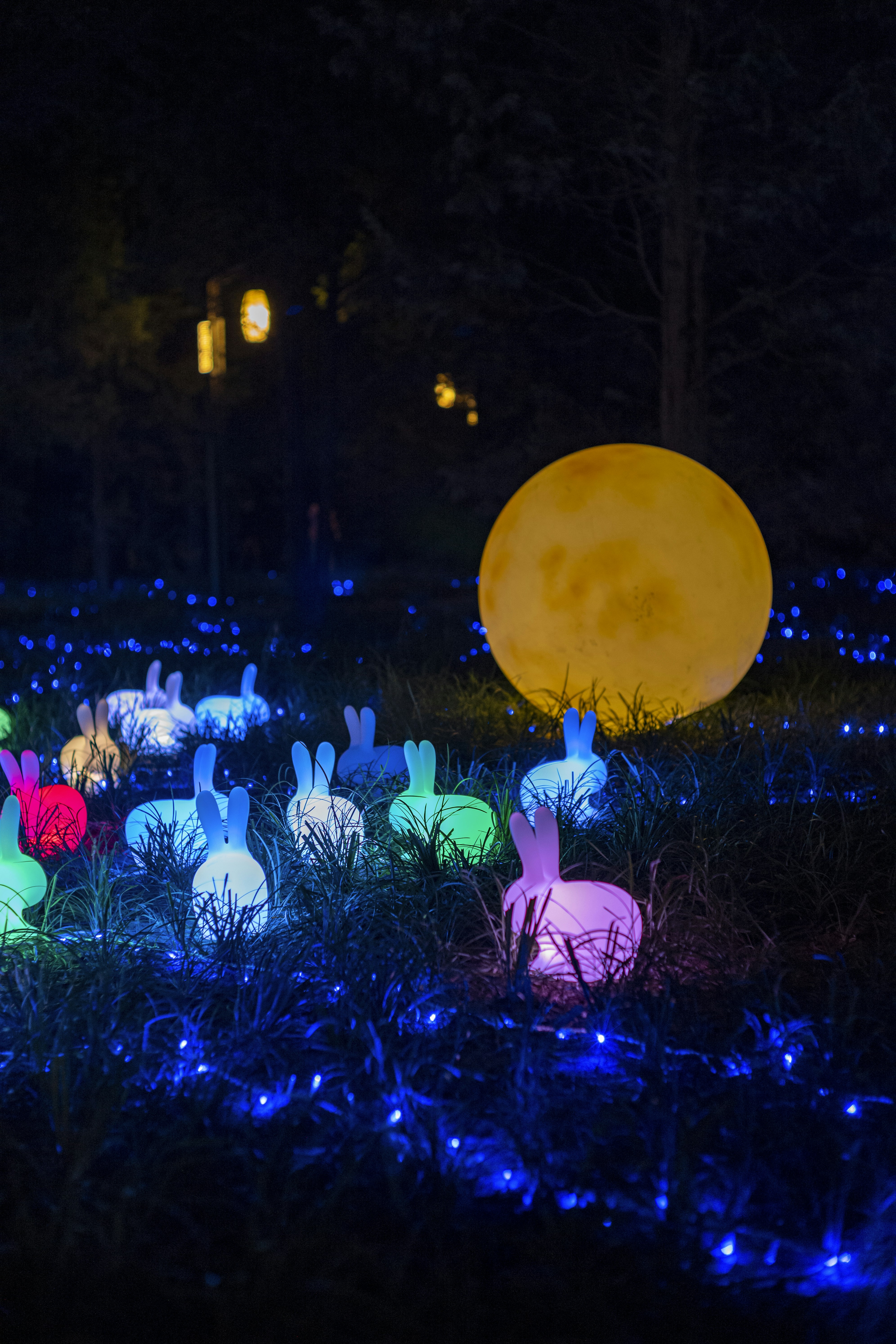 Neon Bunny Field Under a Golden Orb