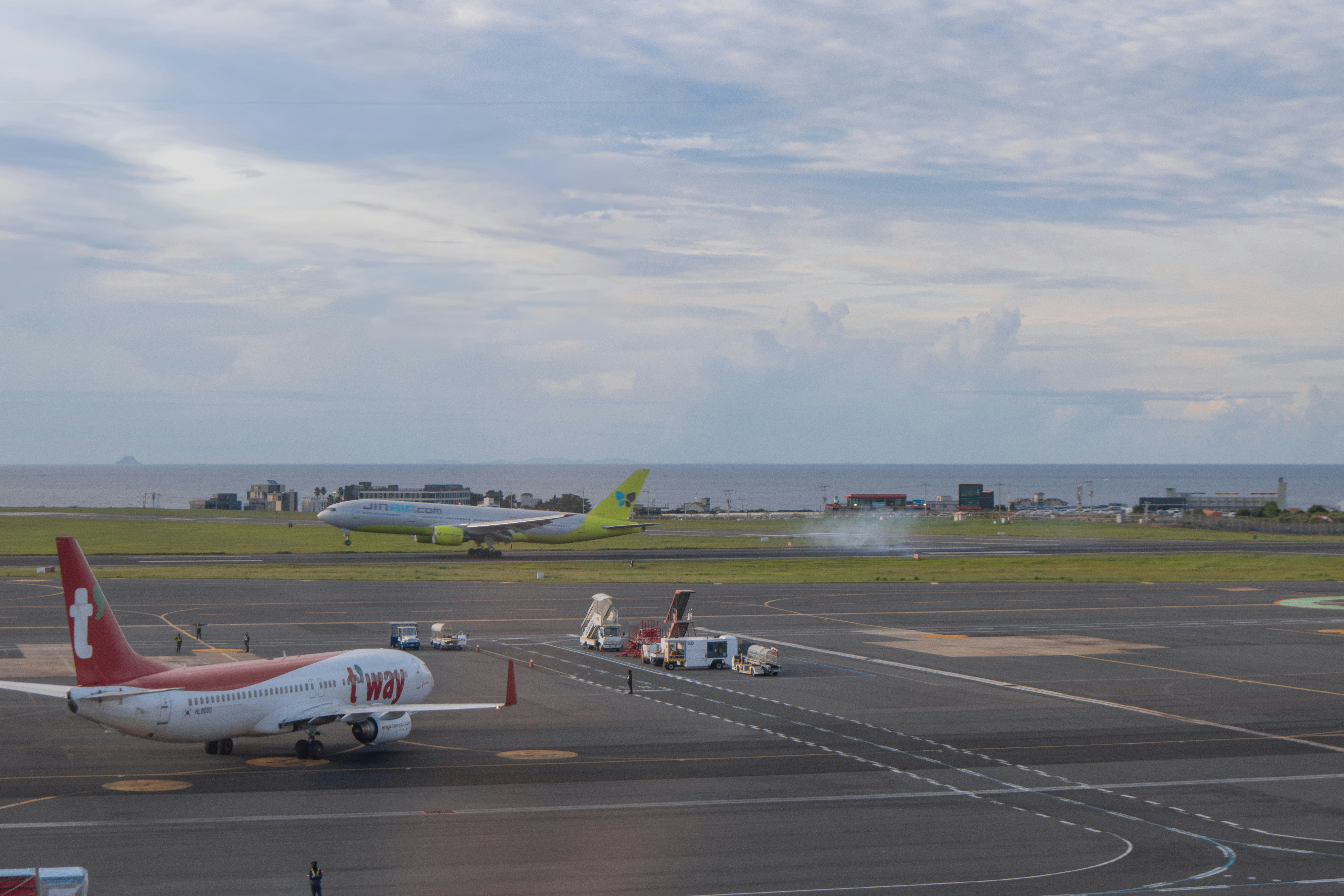 Red-Tipped Jet on a Sea-Front Tarmac