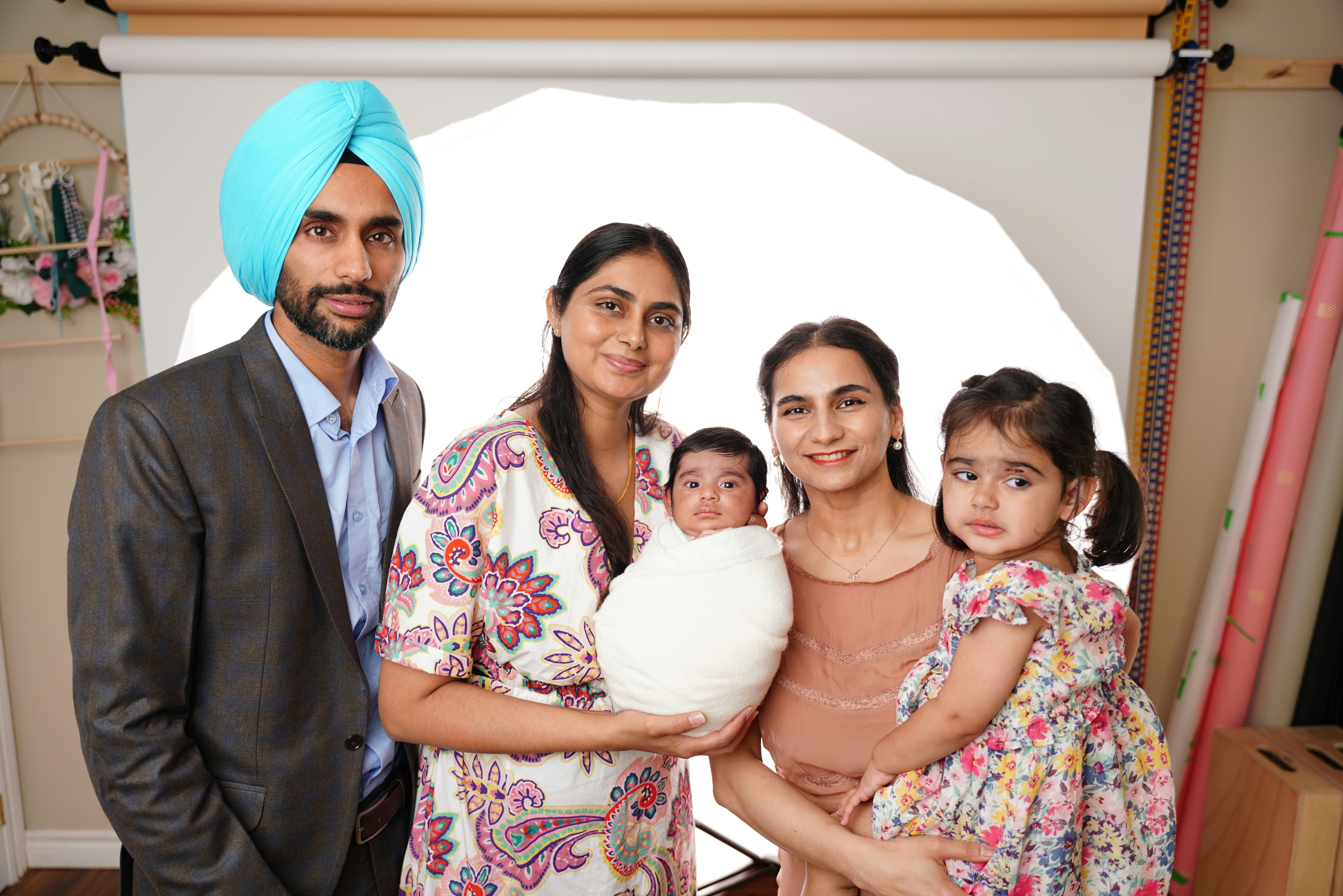 Embracing New Beginnings: A Family Portrait